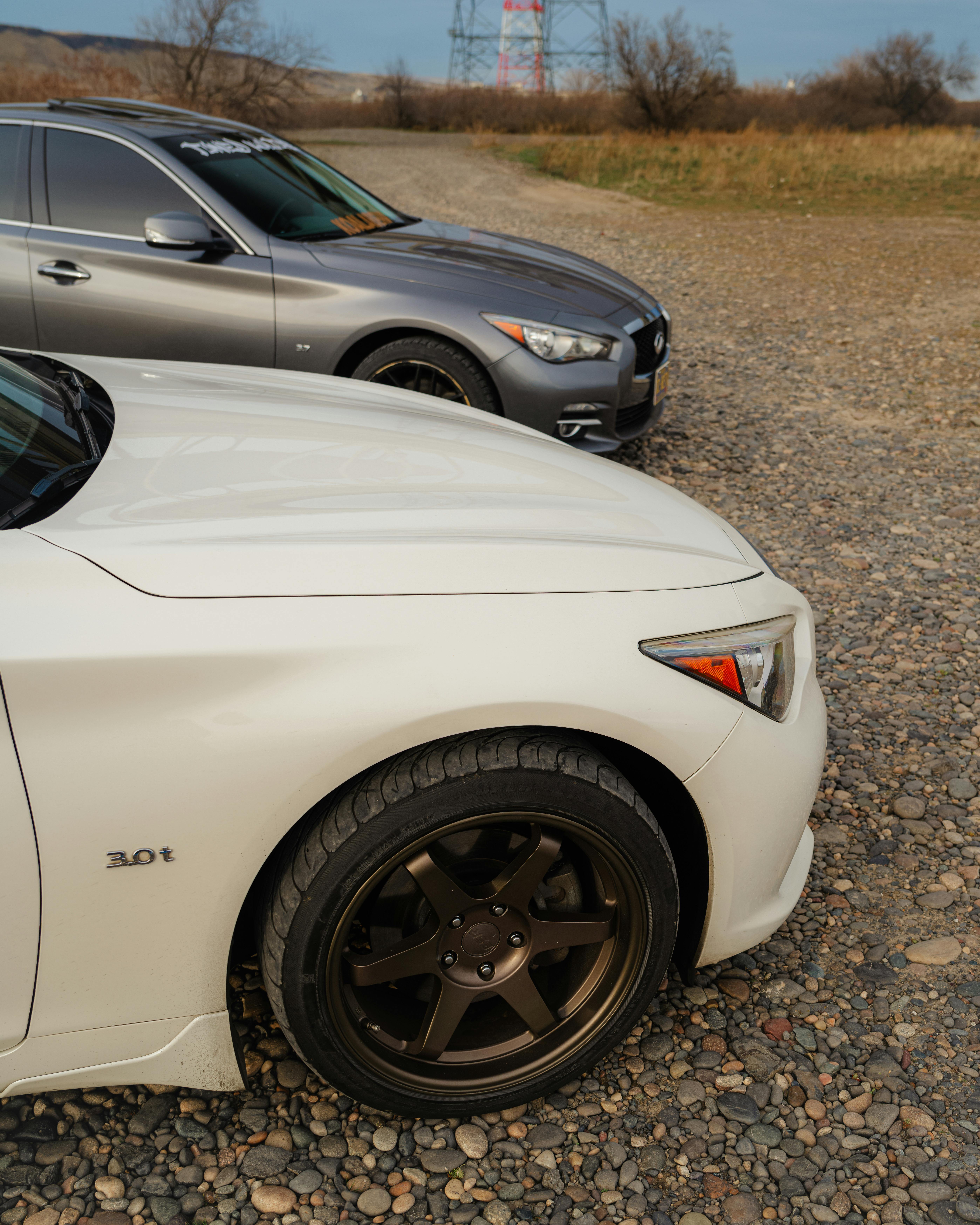 Two Modern Cars Parked next to Each Other · Free Stock Photo