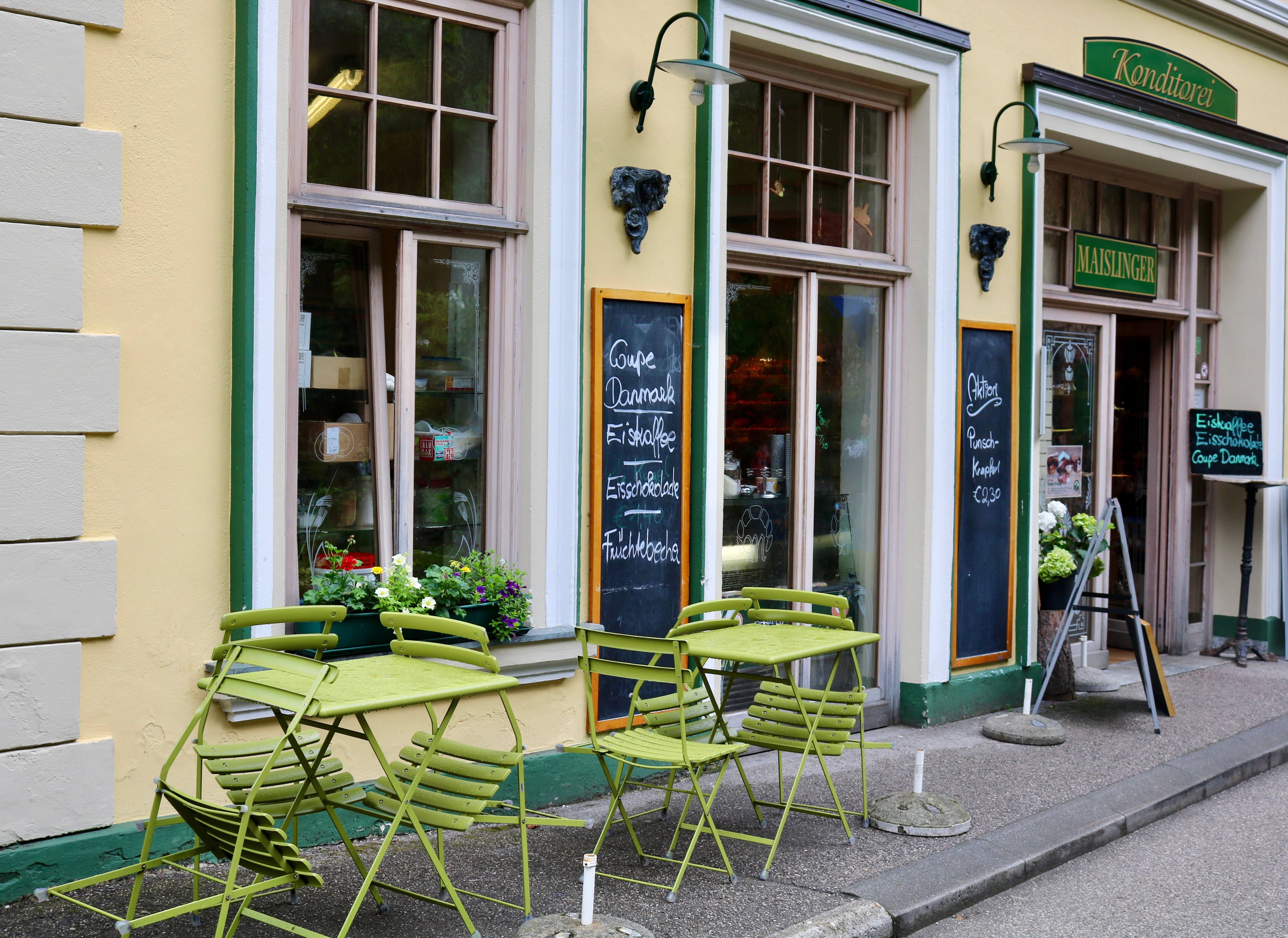Green Furniture in Front of Cafe · Free Stock Photo