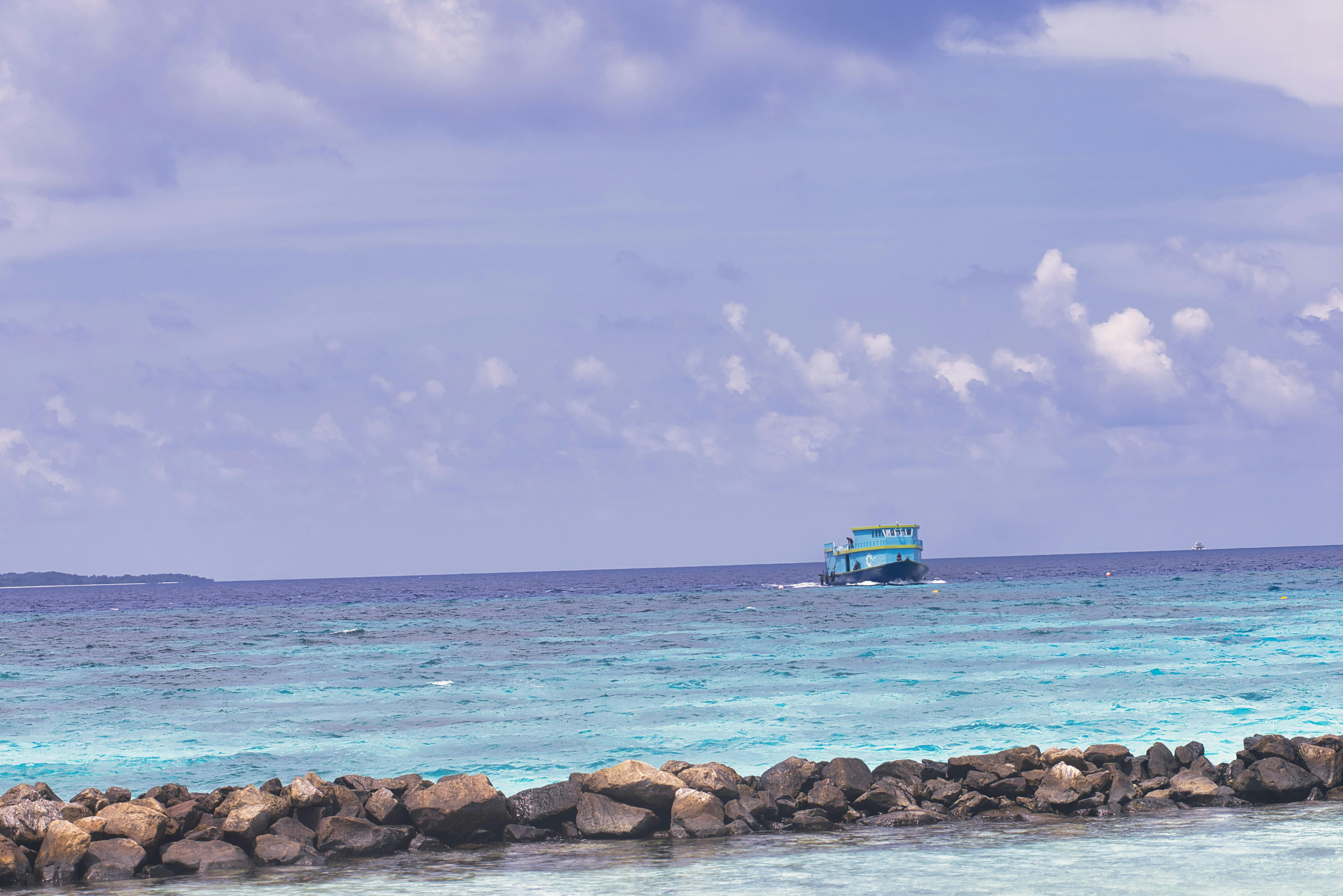 Aerial Photo of Boat on Sea · Free Stock Photo