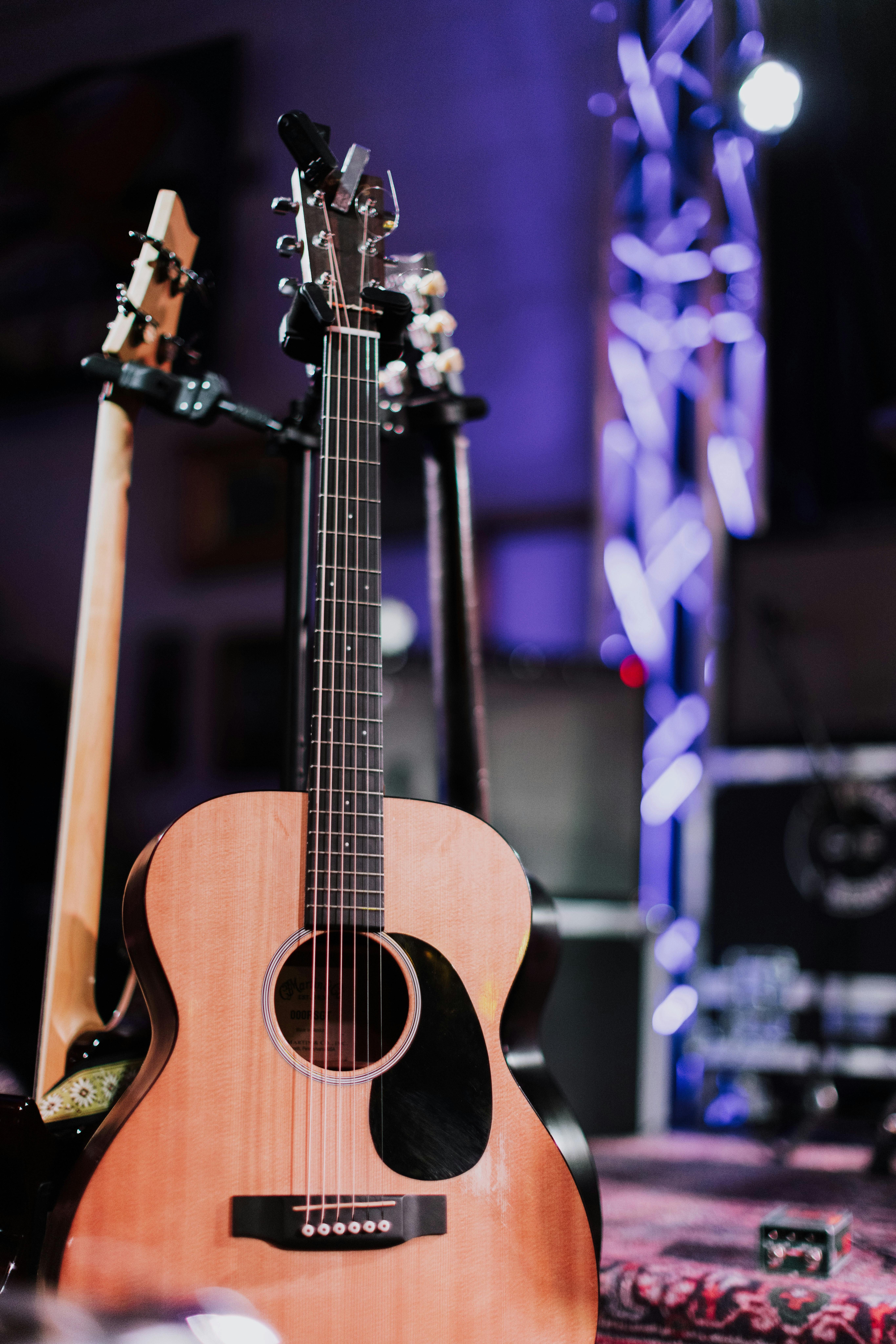 Three Guitars on a Stage before a Concert · Free Stock Photo