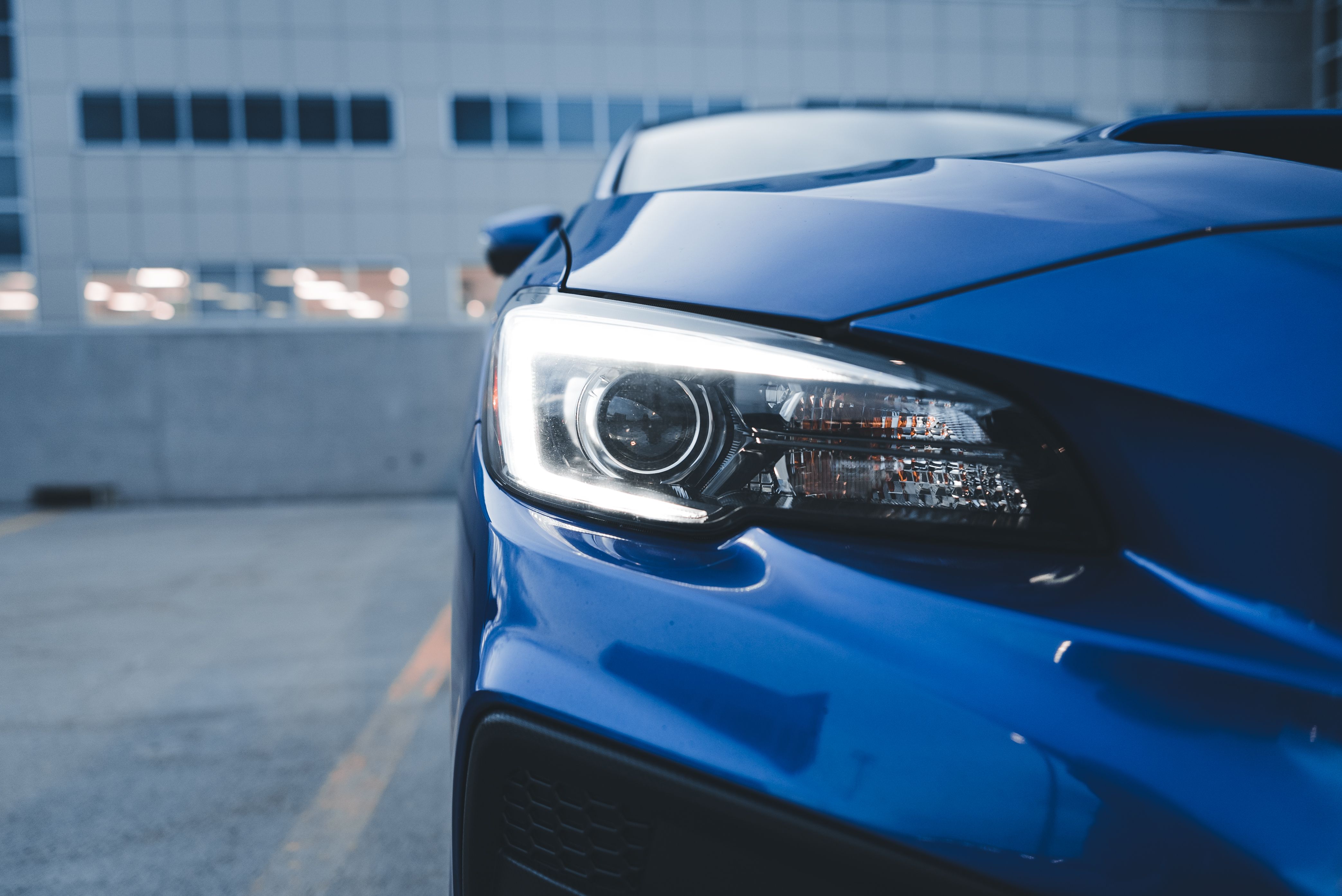 Close Up Shot of a Car Headlight · Free Stock Photo