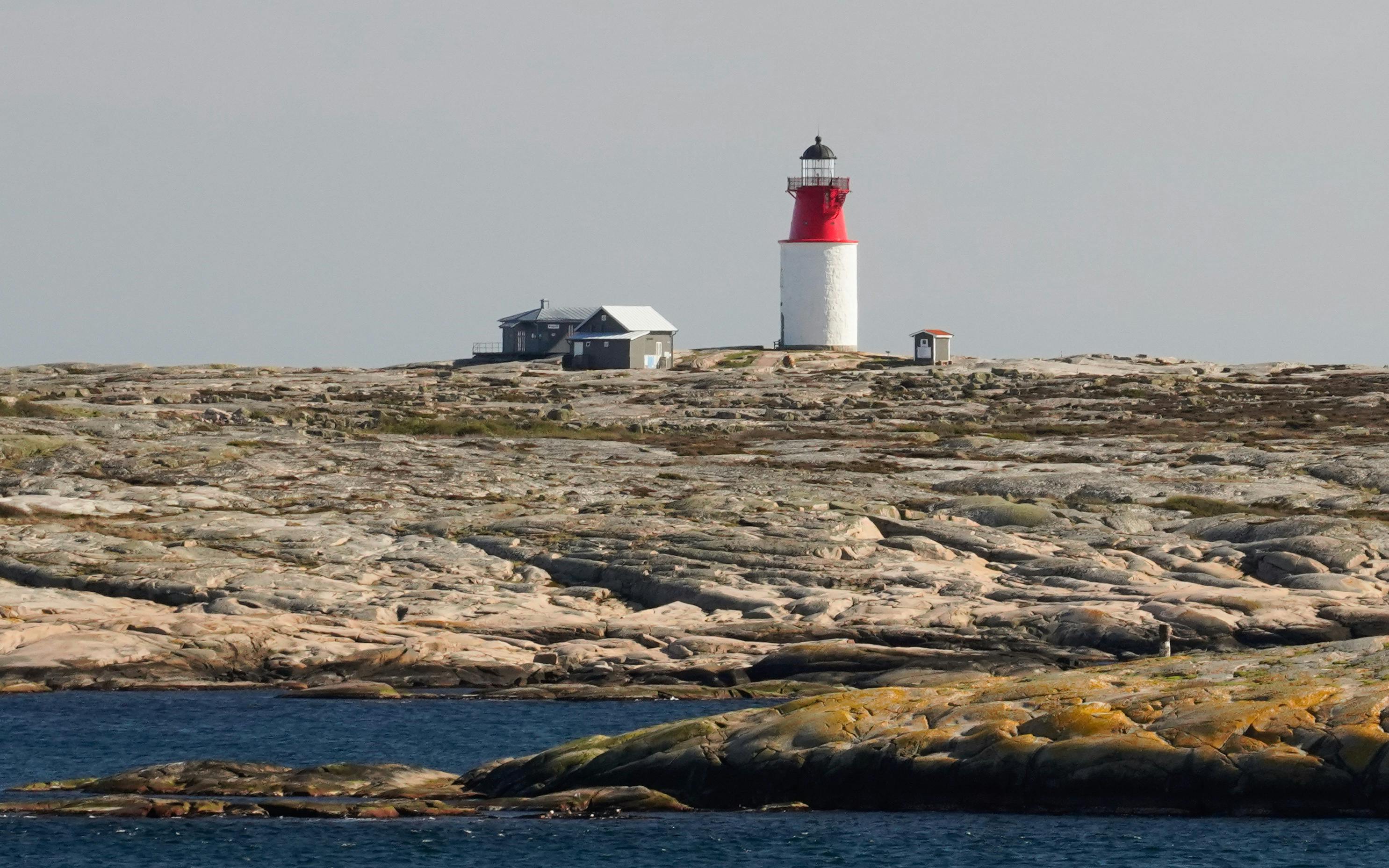Photo Of Lighthouse On Seaside During Daytime · Free Stock Photo