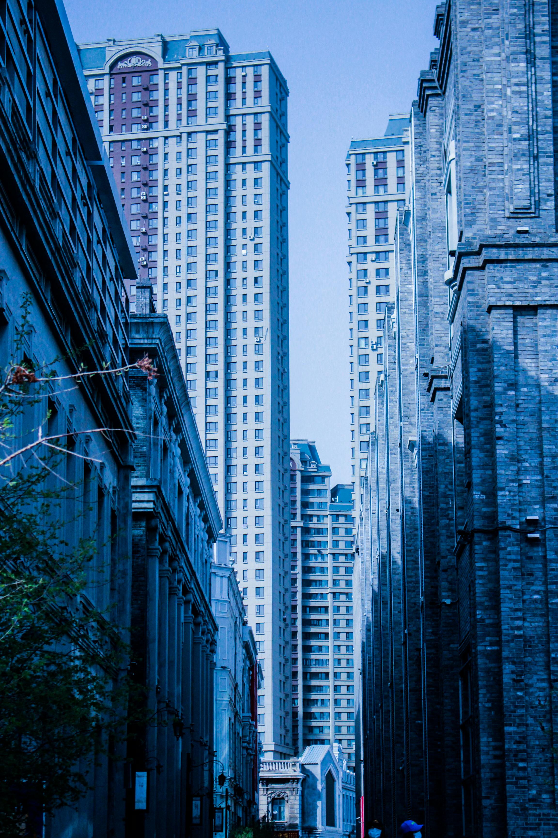 Back Street Overlooking City Skyscrapers · Free Stock Photo