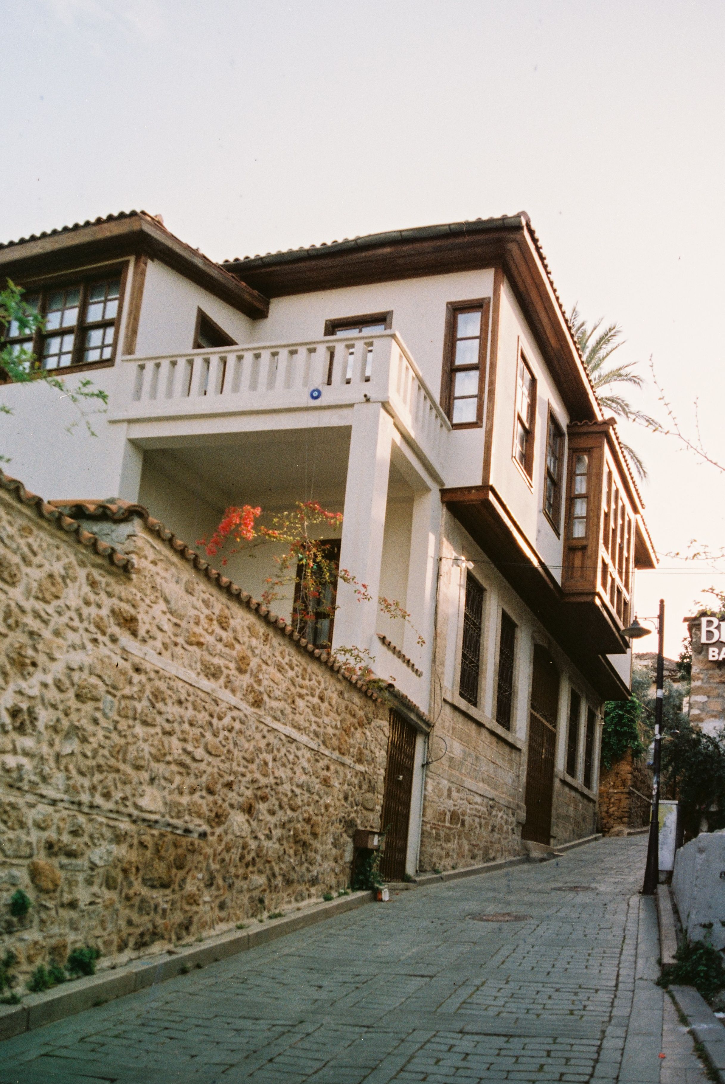 Vintage, Stone Building by Wall · Free Stock Photo