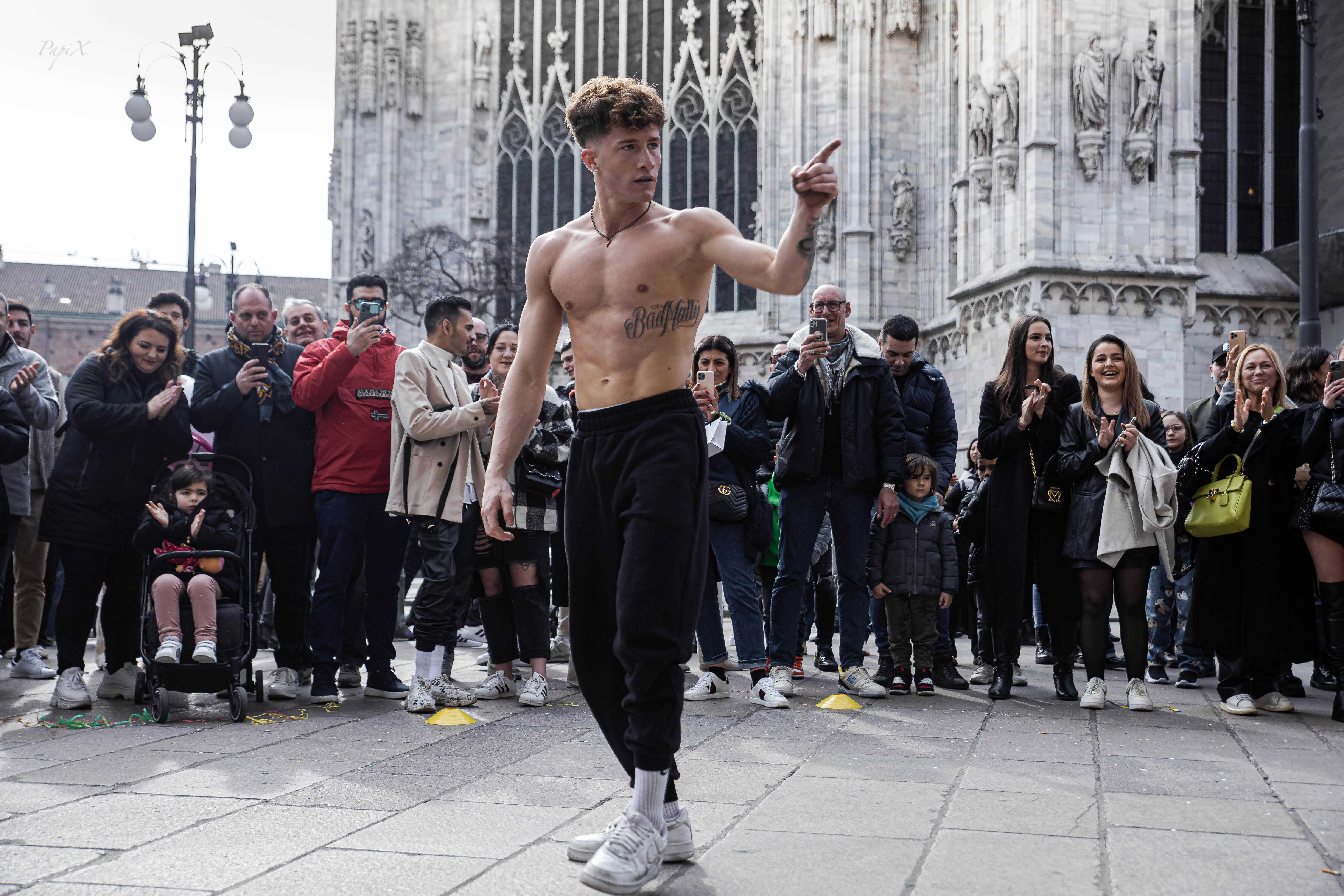 Shirtless Man Dancing in the Crowd · Free Stock Photo
