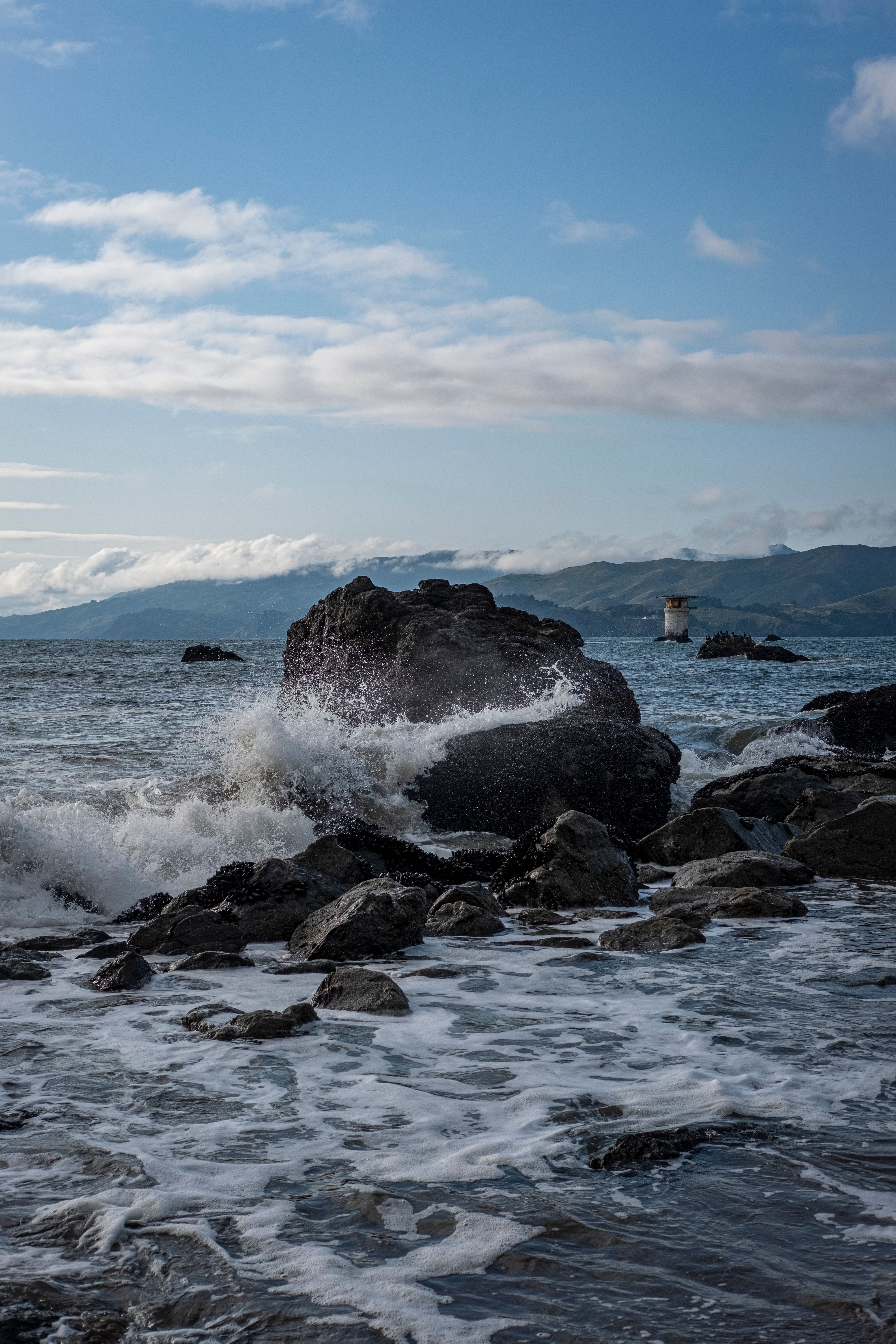 Photo Of Waves Crashing On Rocks · Free Stock Photo