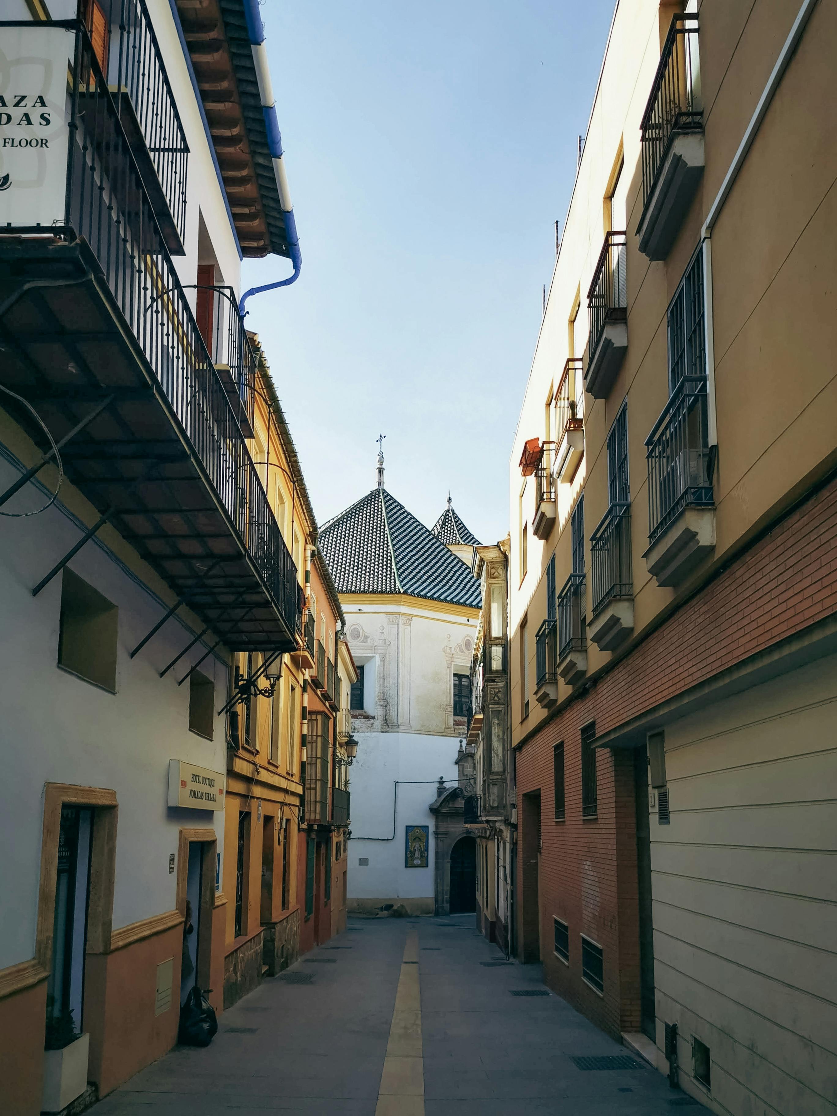 Black and White Photo of a Narrow City Street with Old and Modern ...