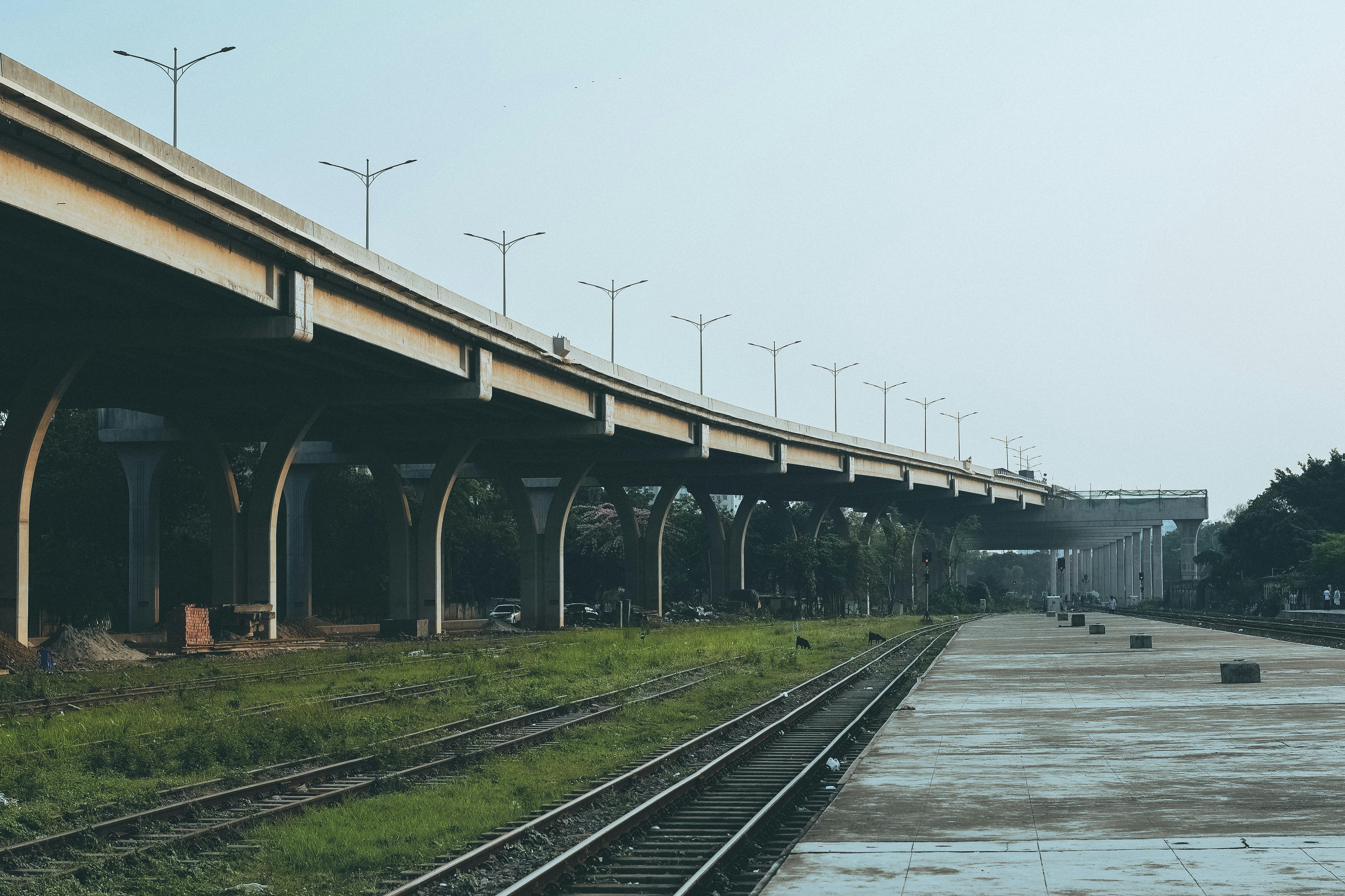 Empty Platform at Railway Station with Viaduct near · Free Stock Photo