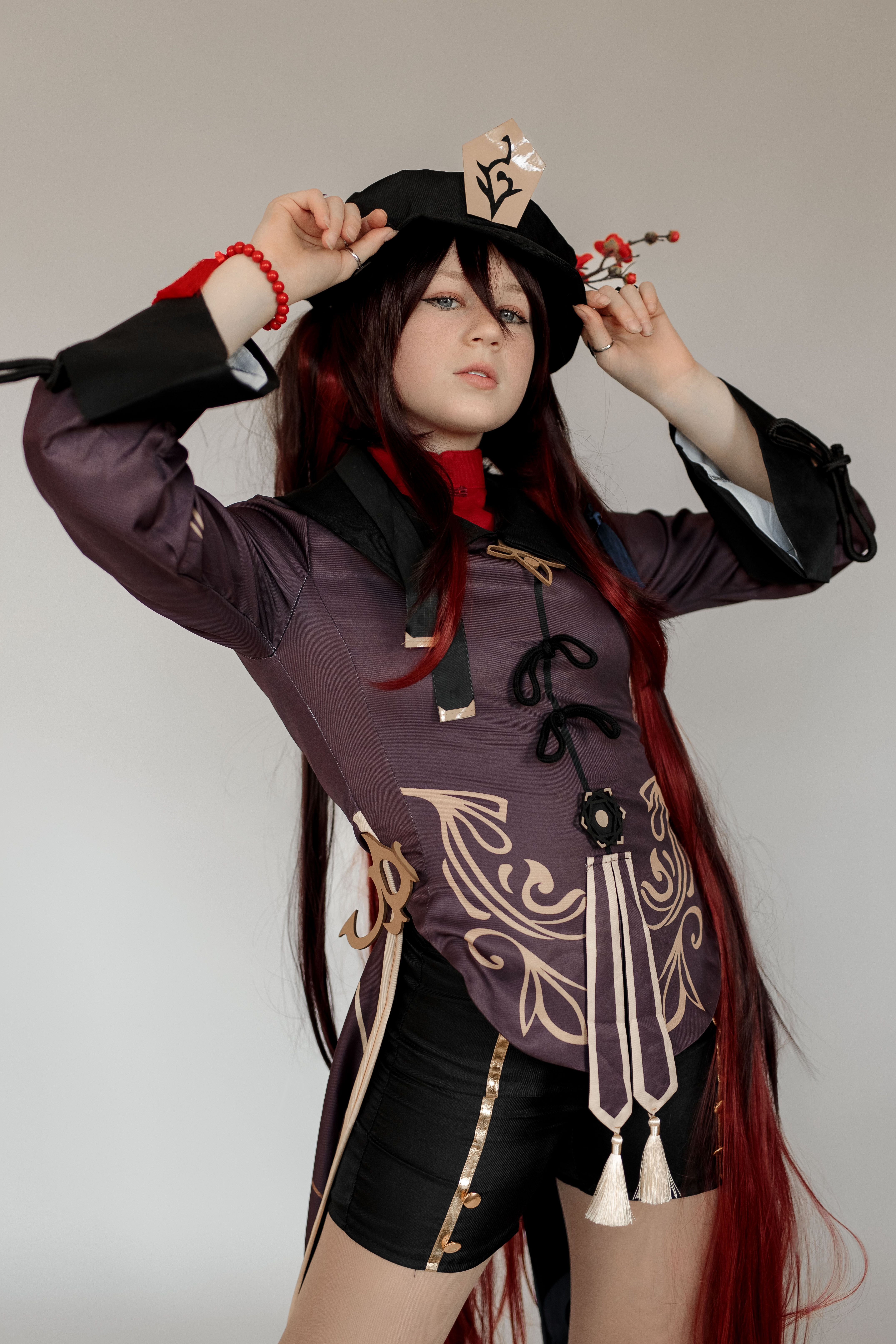 A Woman Cosplaying Lumine from Genshin Impact · Free Stock Photo