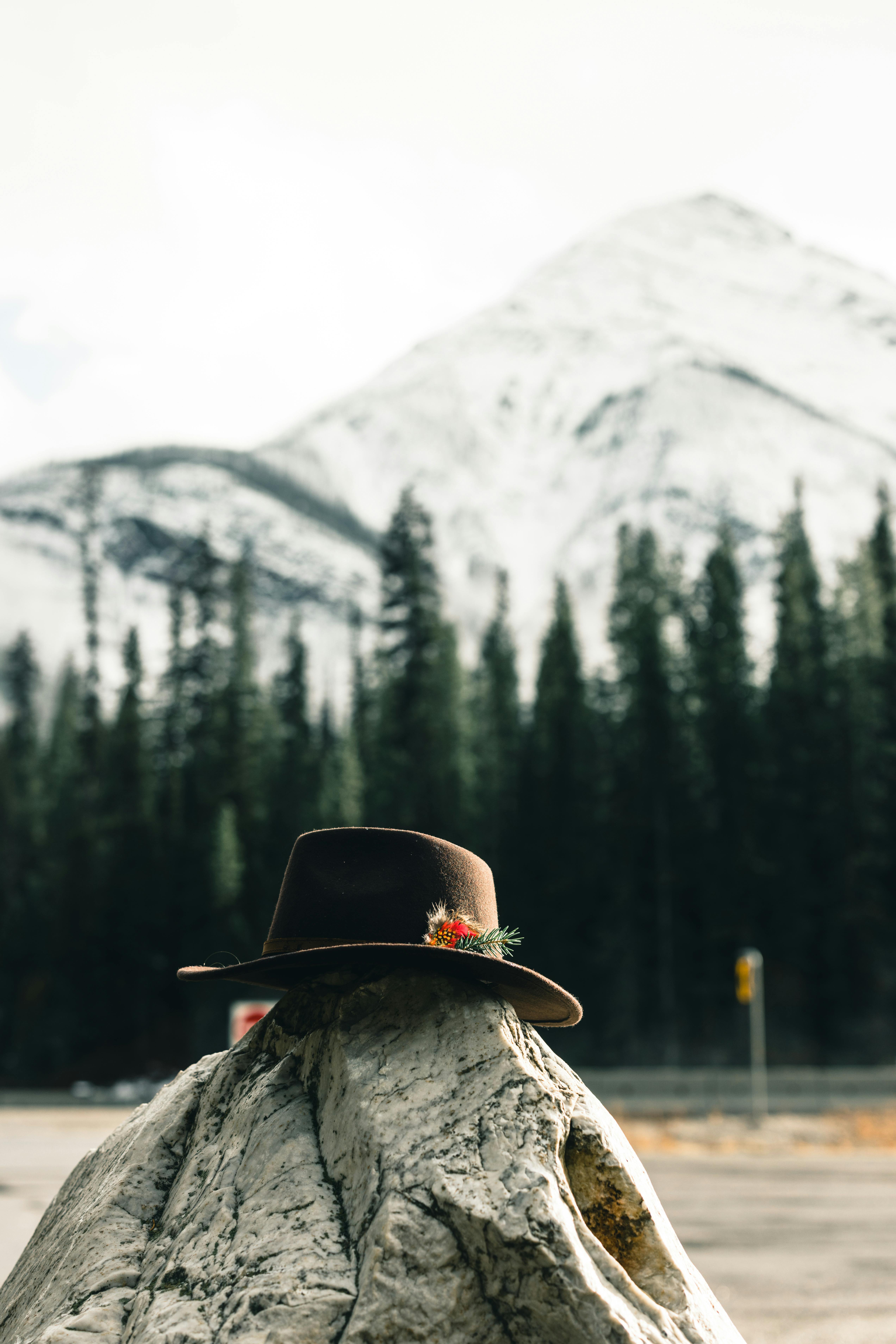 Hat on Rock in Mountains · Free Stock Photo