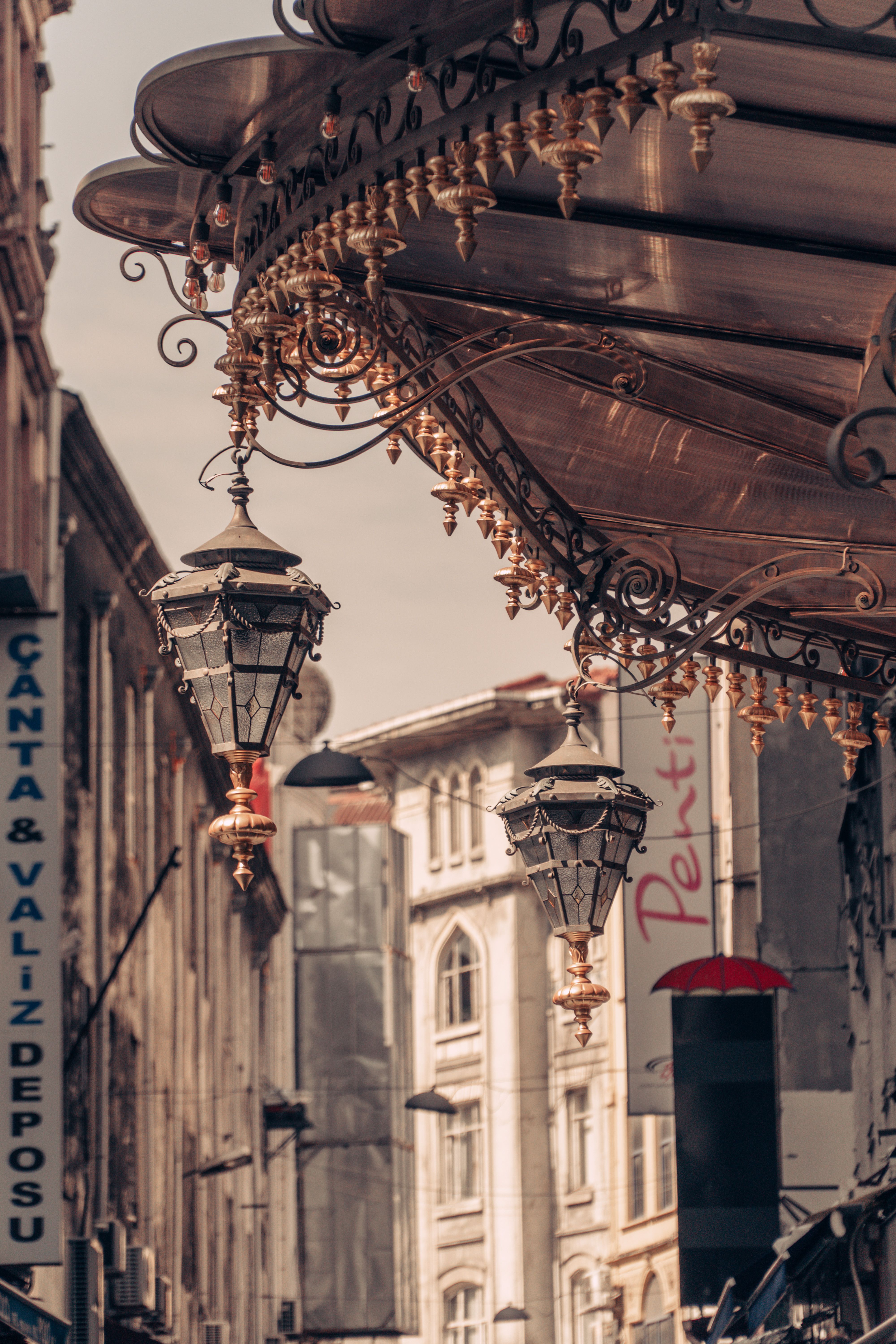 Traditional Vintage Lanterns Hanging from the Roof of a Building in ...