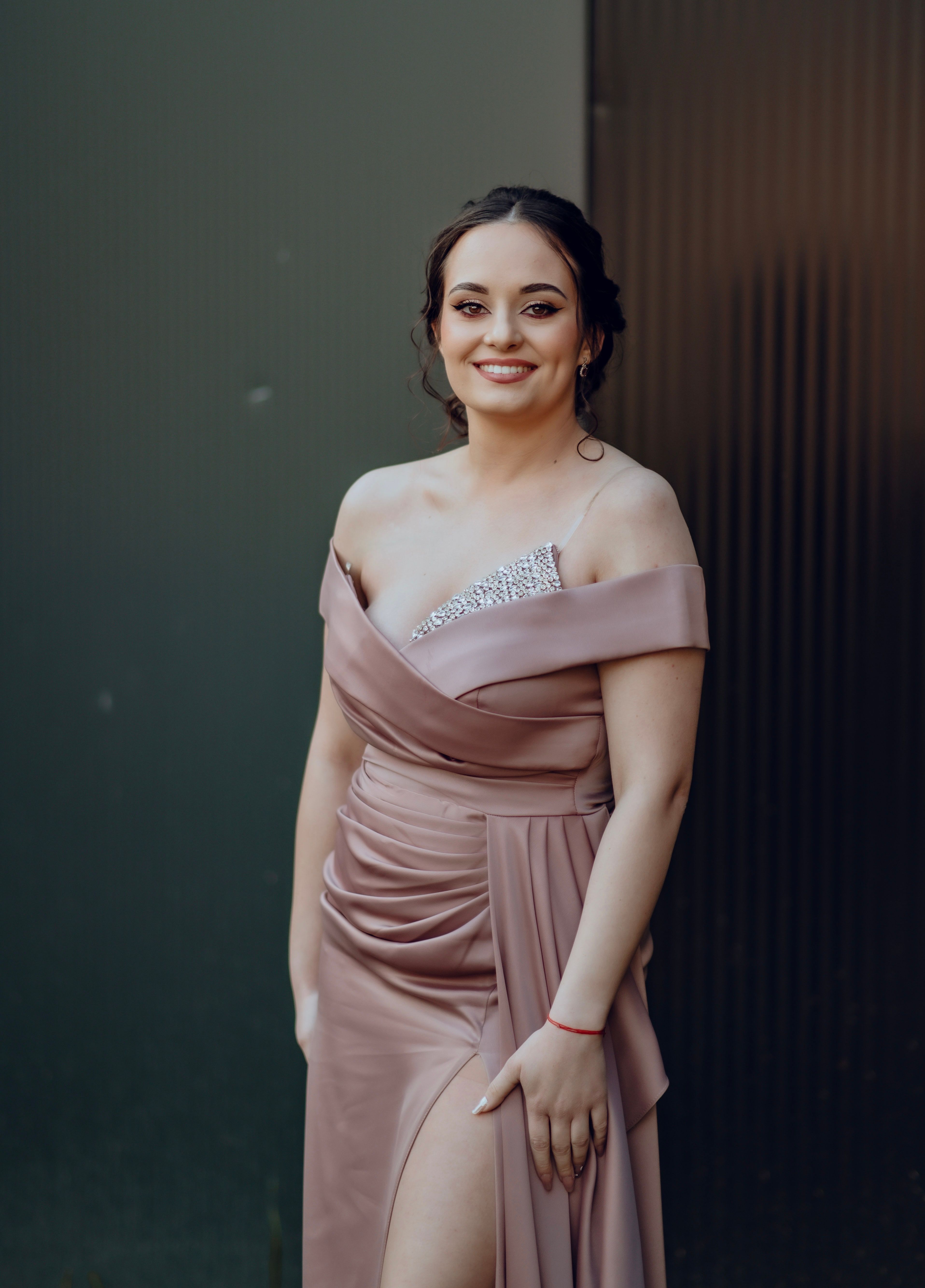 Young Woman Wearing an Elegant Dress · Free Stock Photo