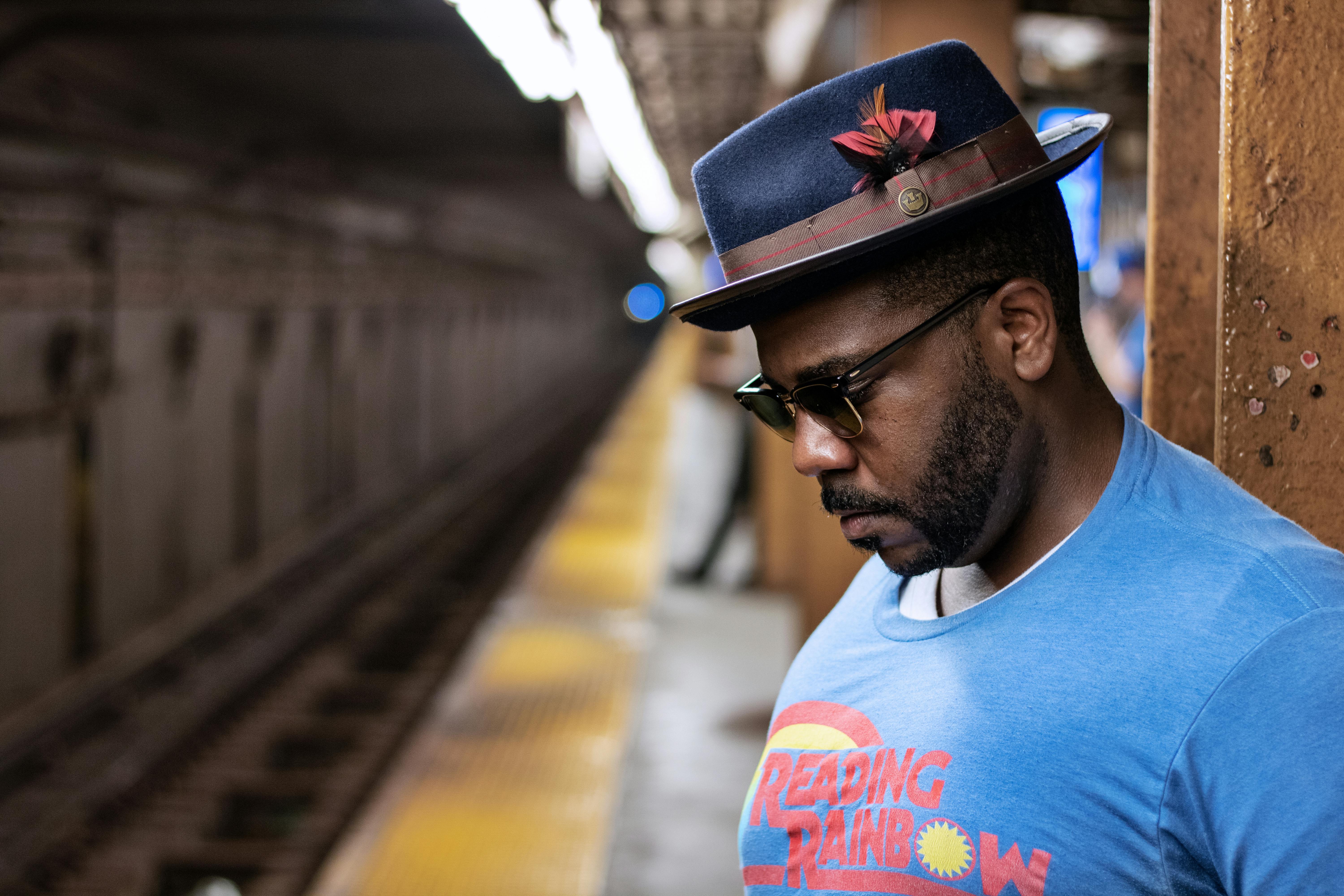 Portrait of Man Standing on Train Platform · Free Stock Photo