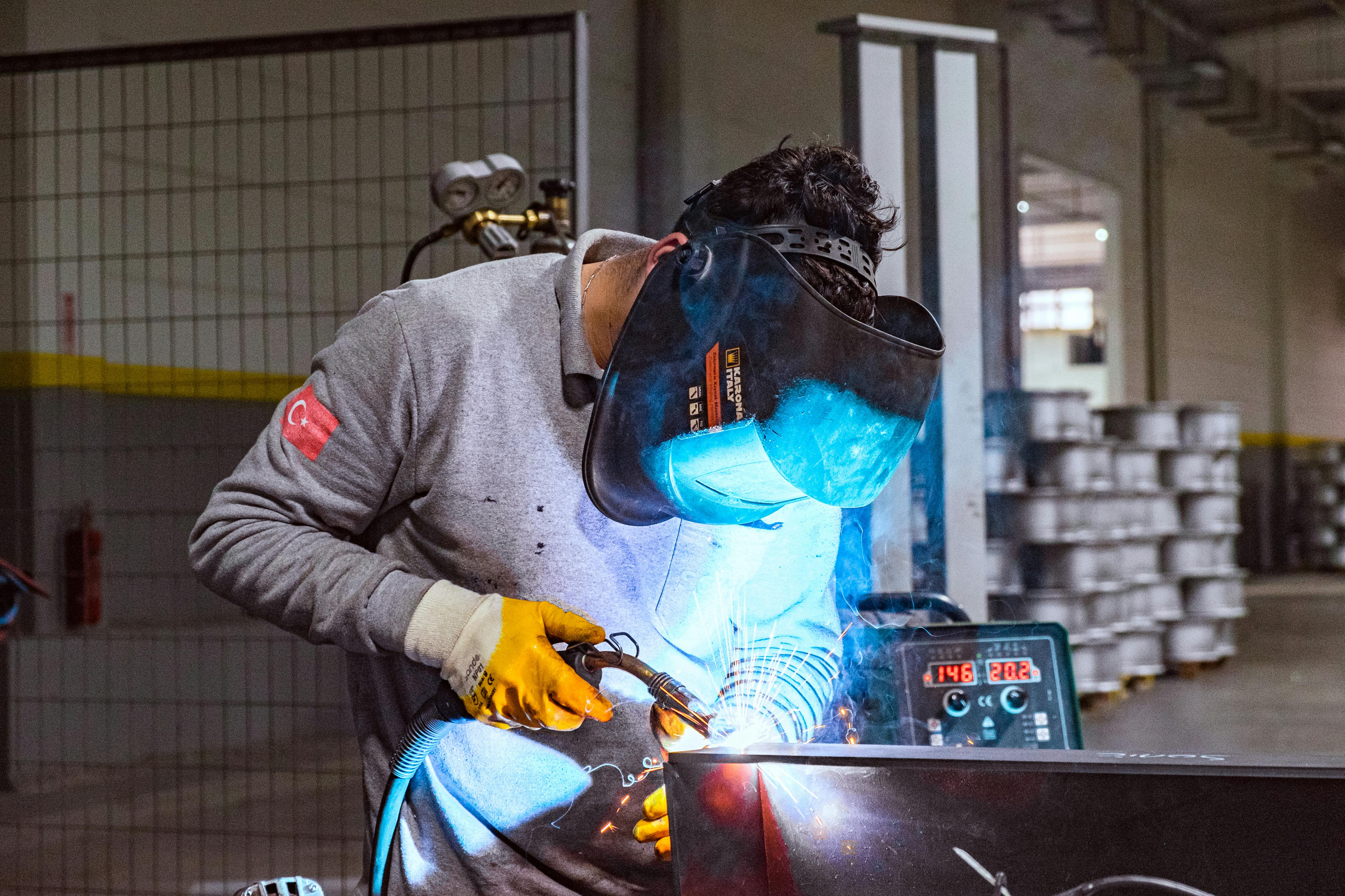 Grinder Working in Mask · Free Stock Photo