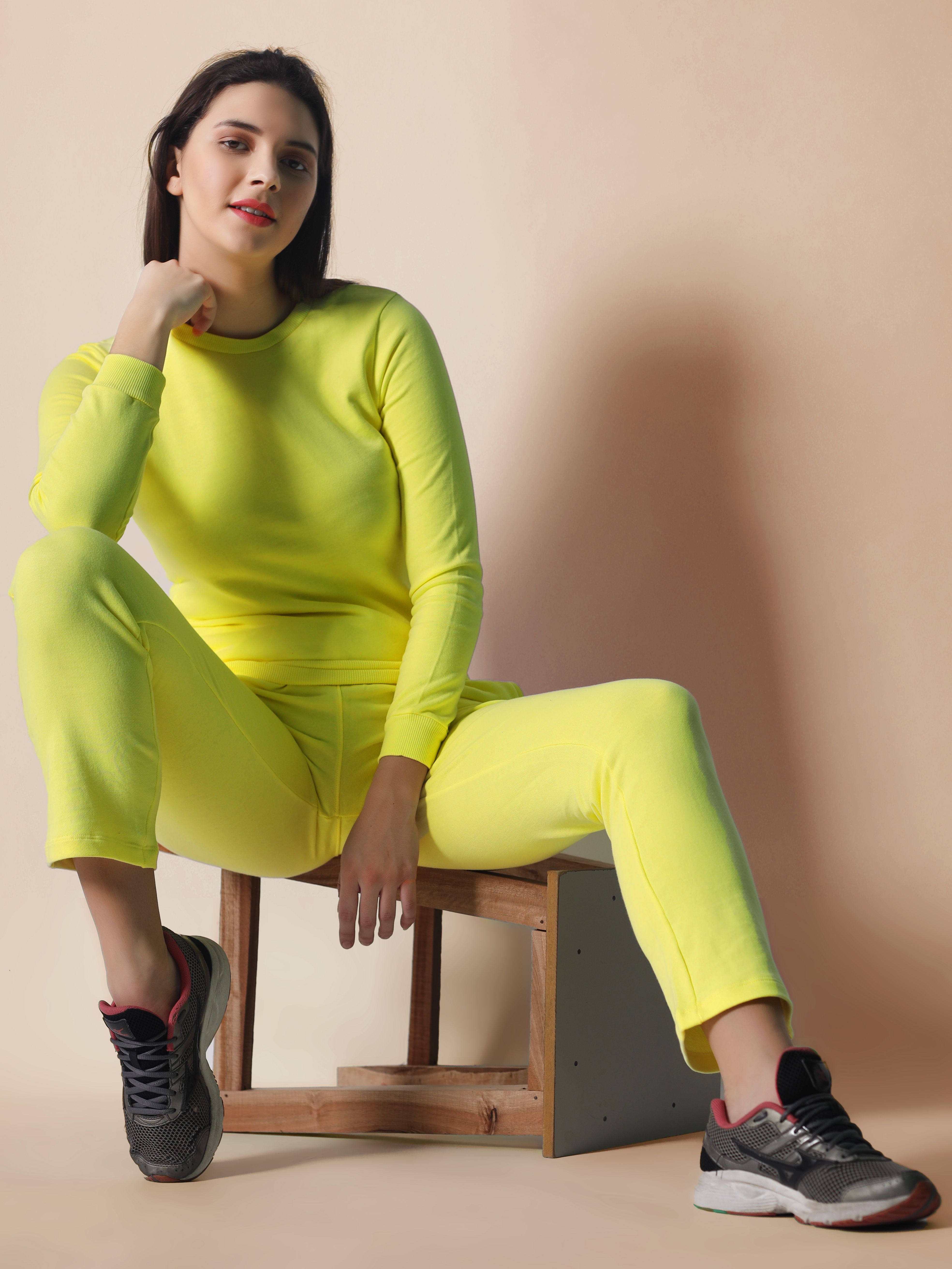 Woman in a Yellow Track Suit · Free Stock Photo
