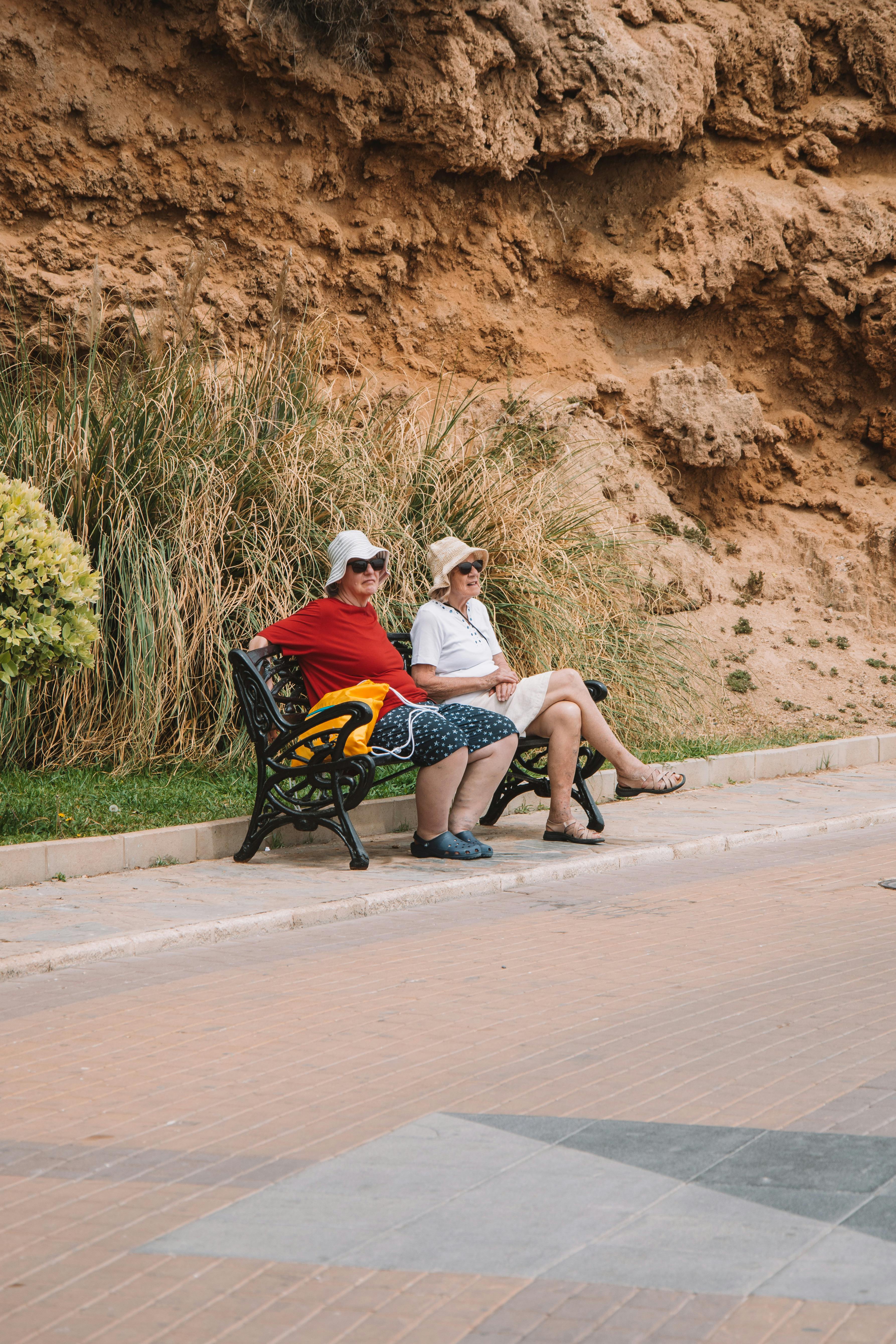 Women Sitting on Bench · Free Stock Photo