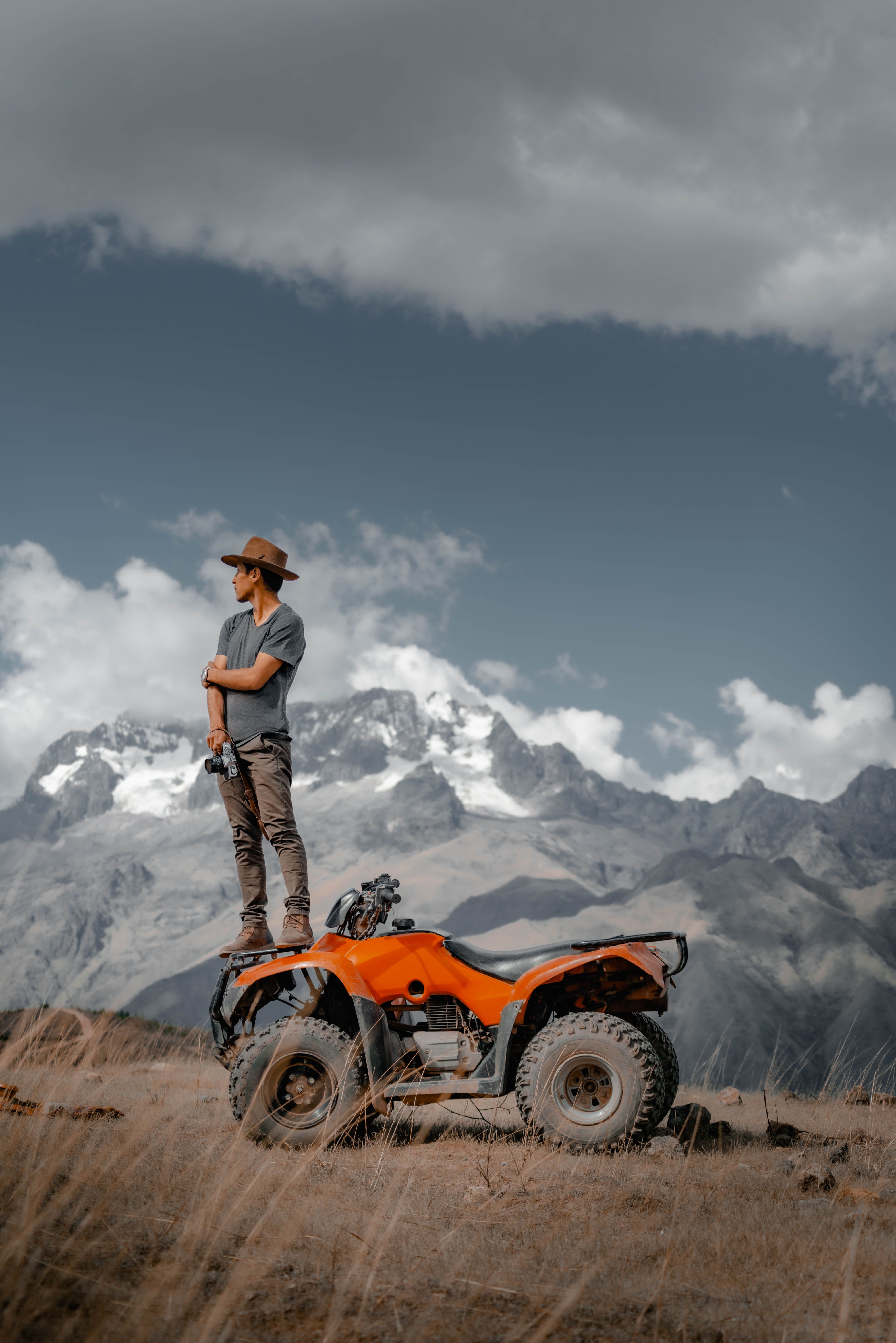 Man Posing on Quad in Mountains · Free Stock Photo