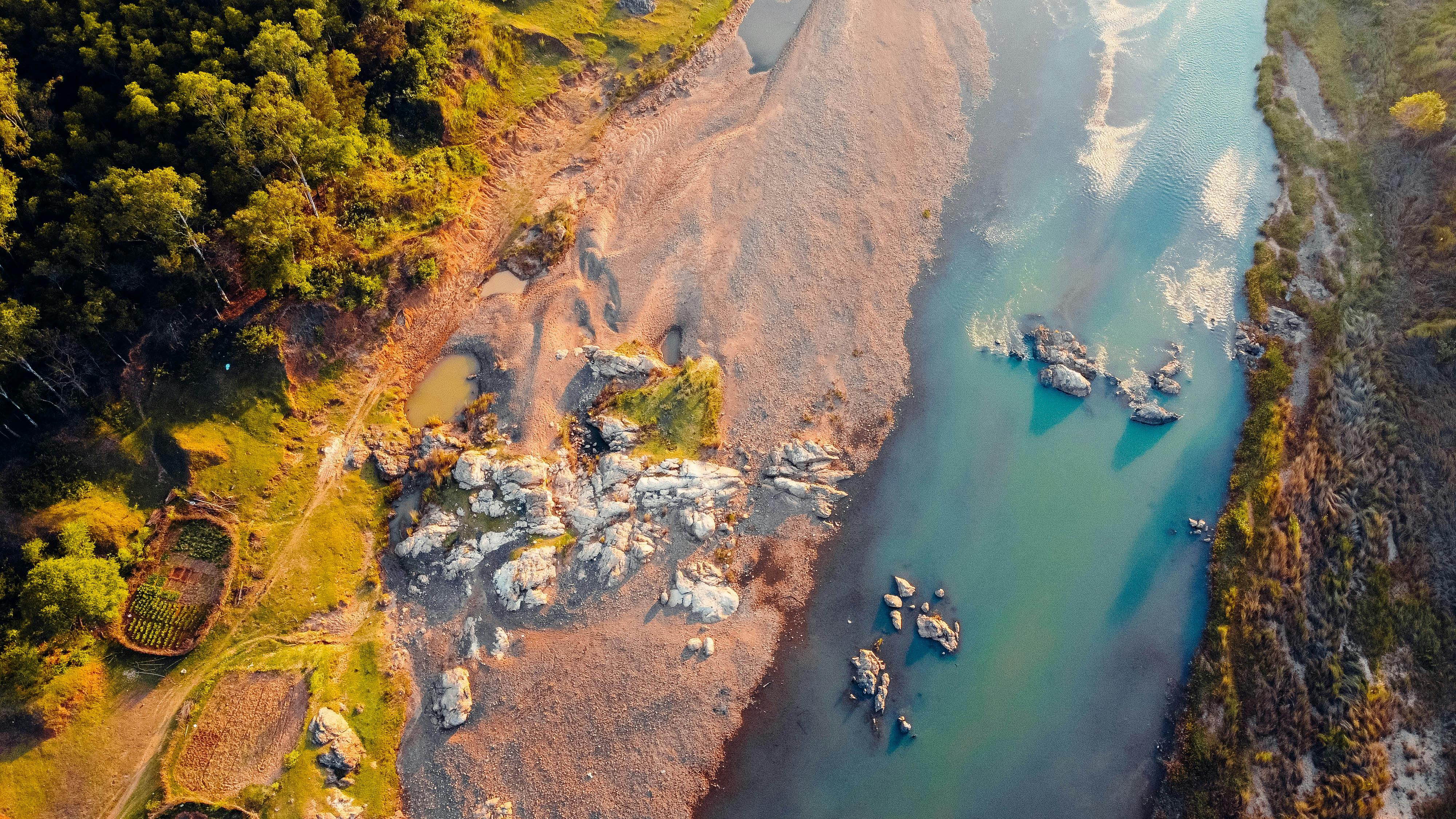 Birds Eye View of River and Riverbank · Free Stock Photo