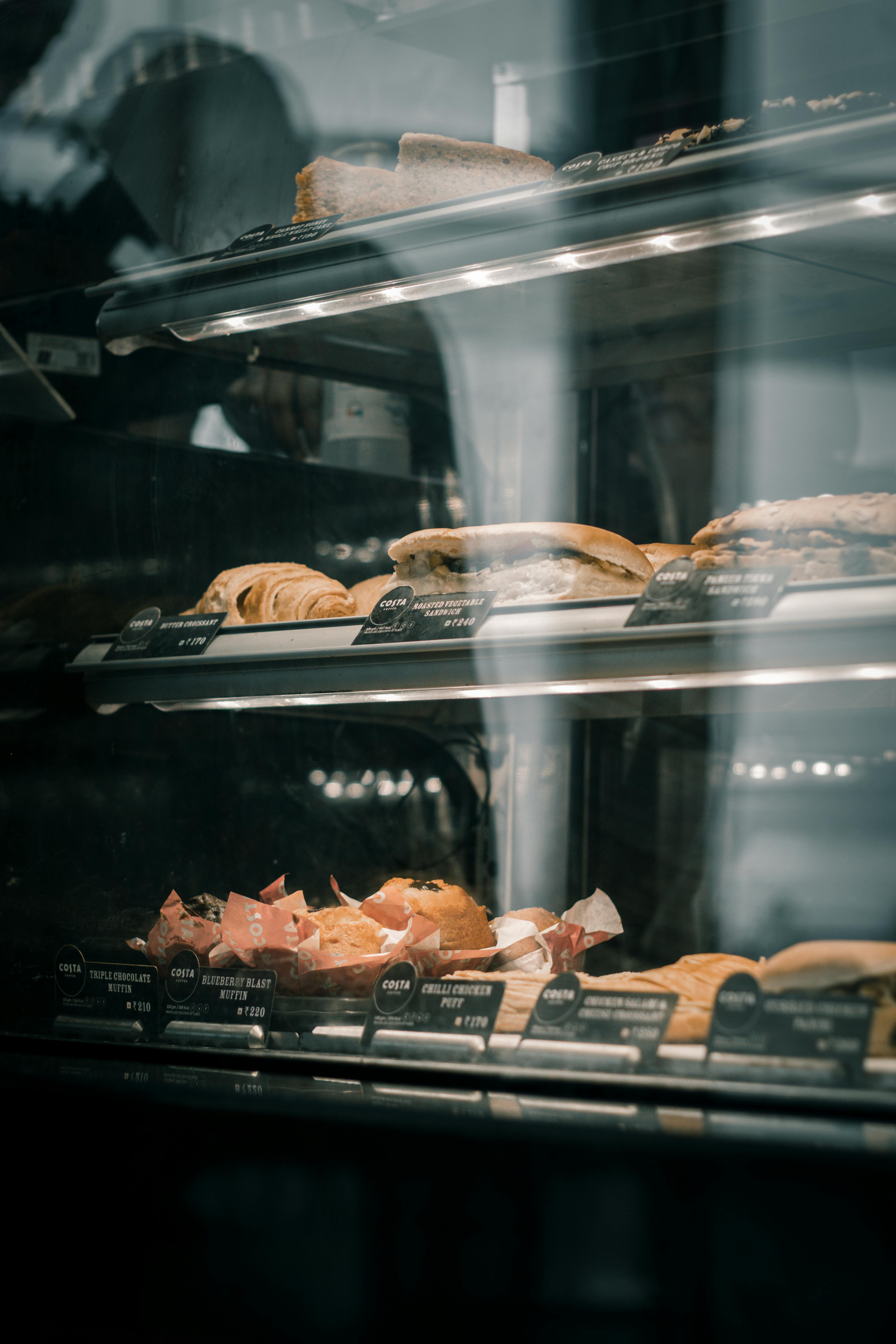 Sandwiches behind Bakery Window · Free Stock Photo