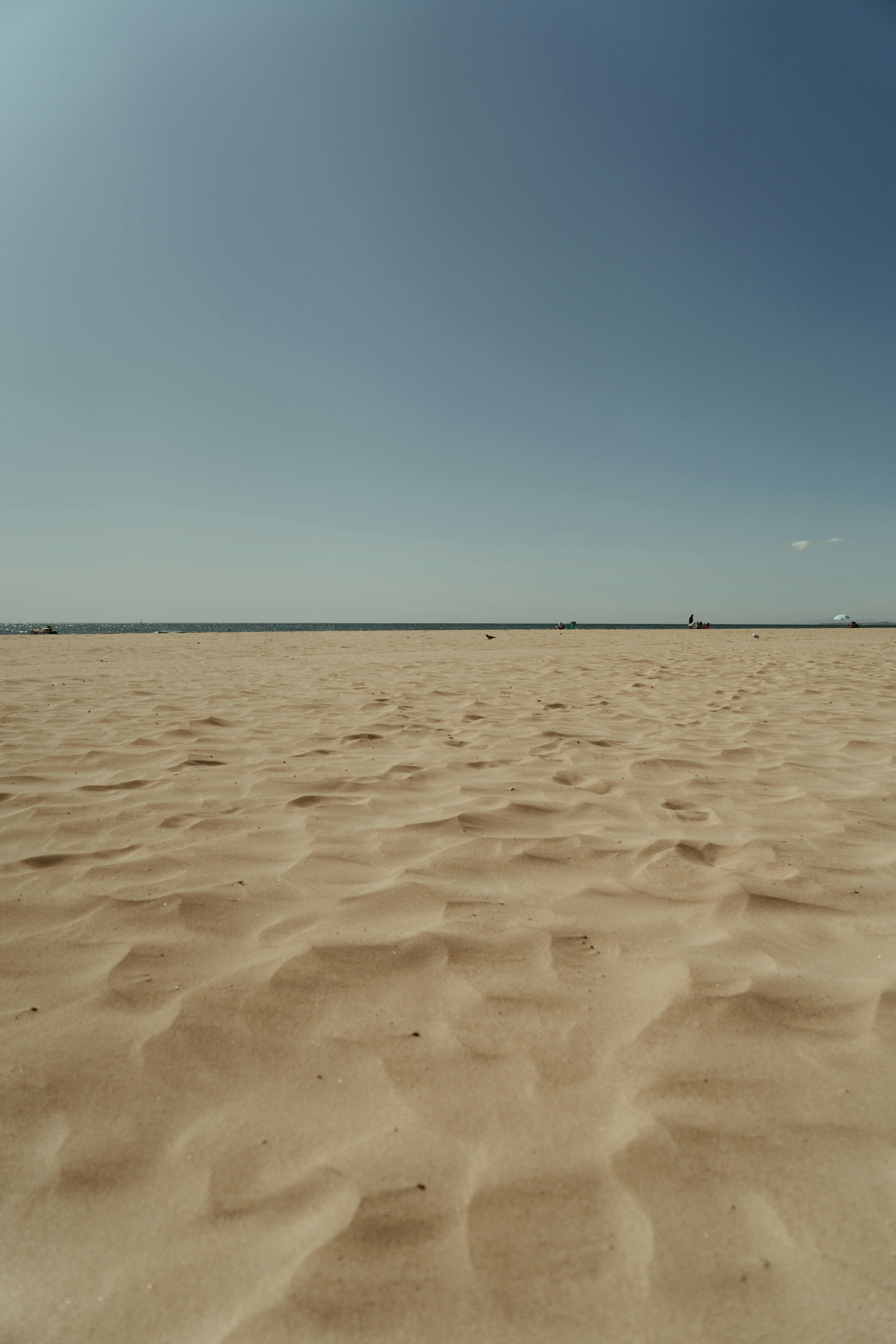Sunlit Sand on Beach · Free Stock Photo