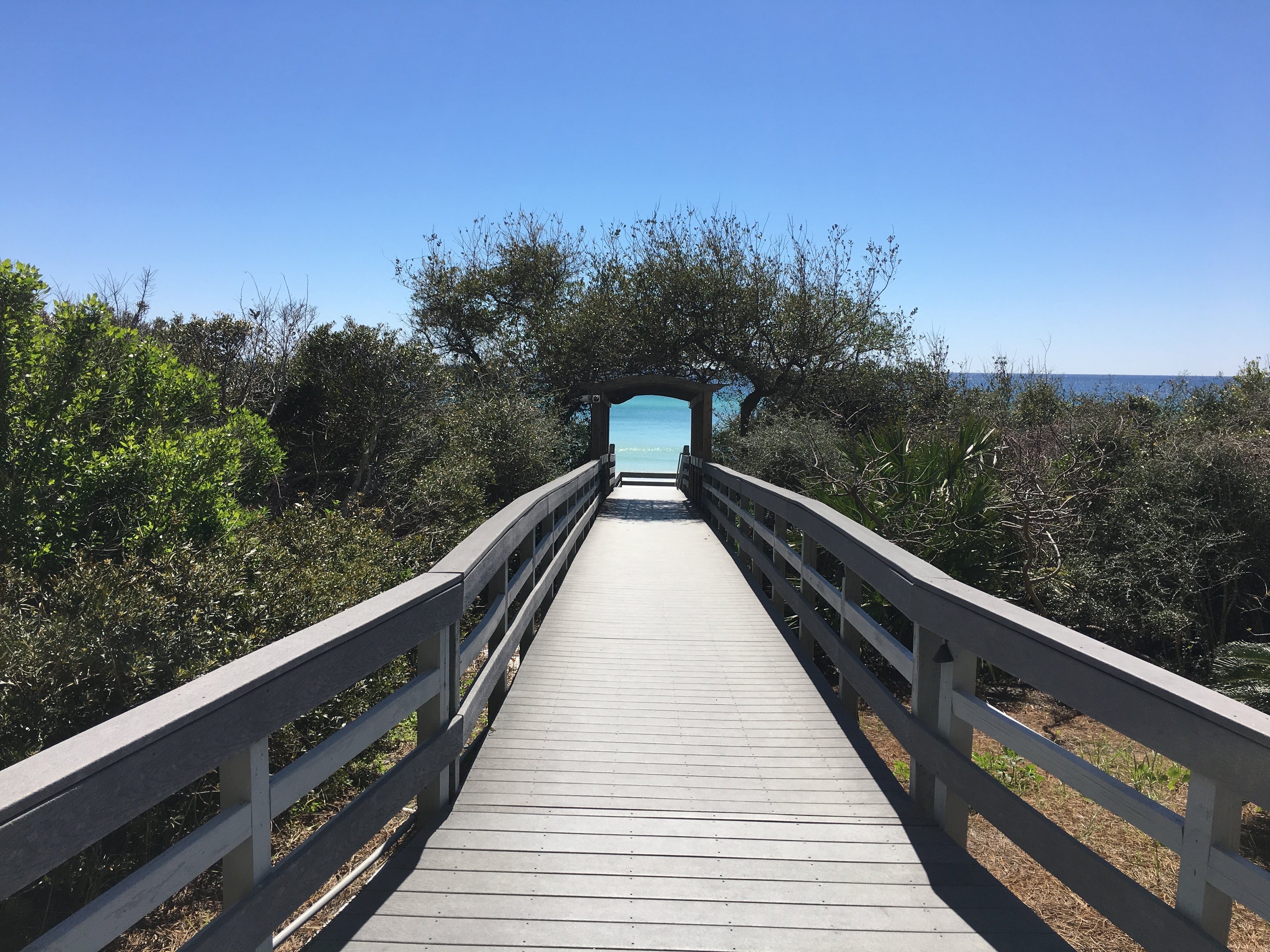Boardwalk and a Beach · Free Stock Photo