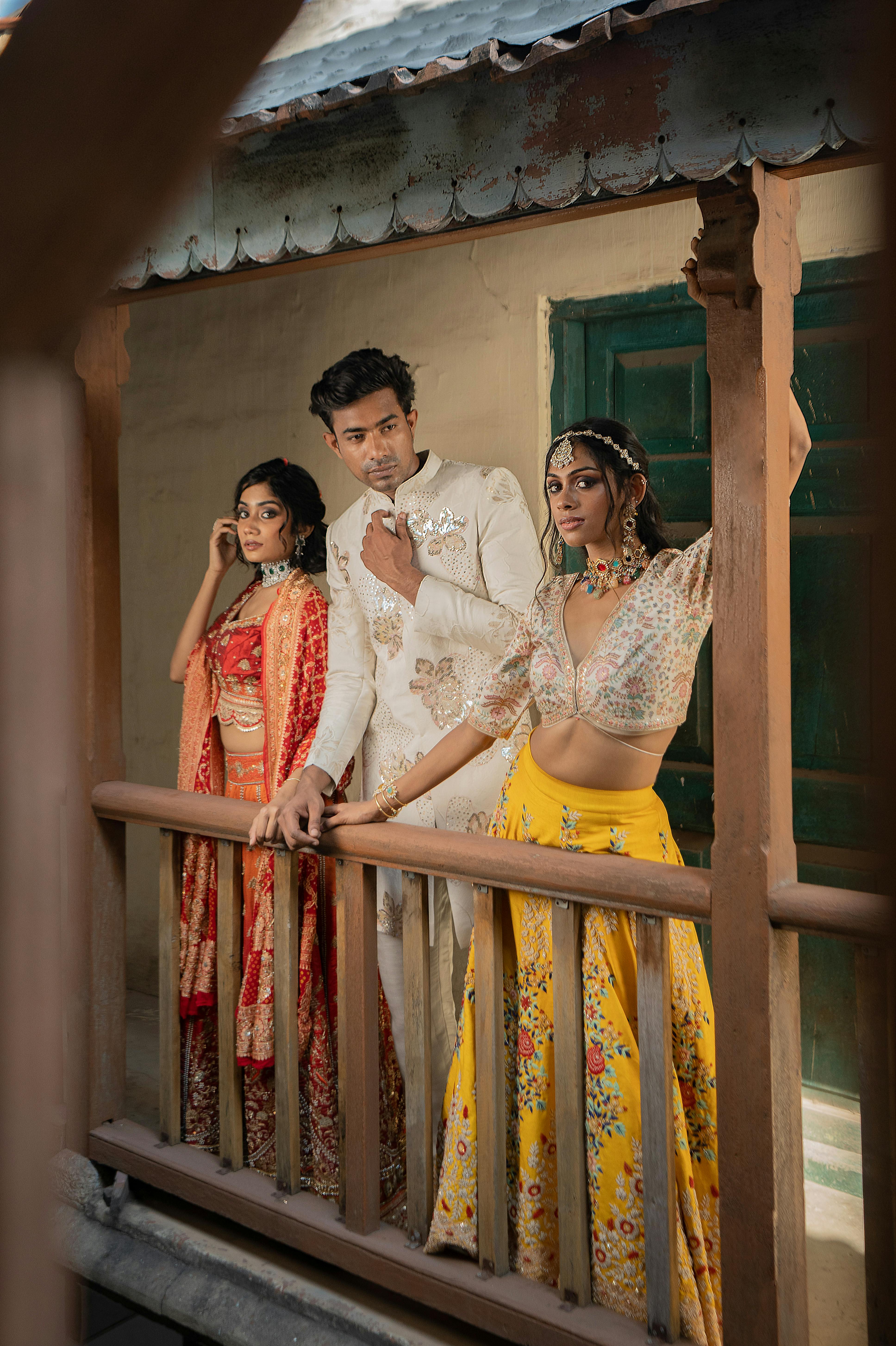 Women and Man in Traditional Clothing · Free Stock Photo