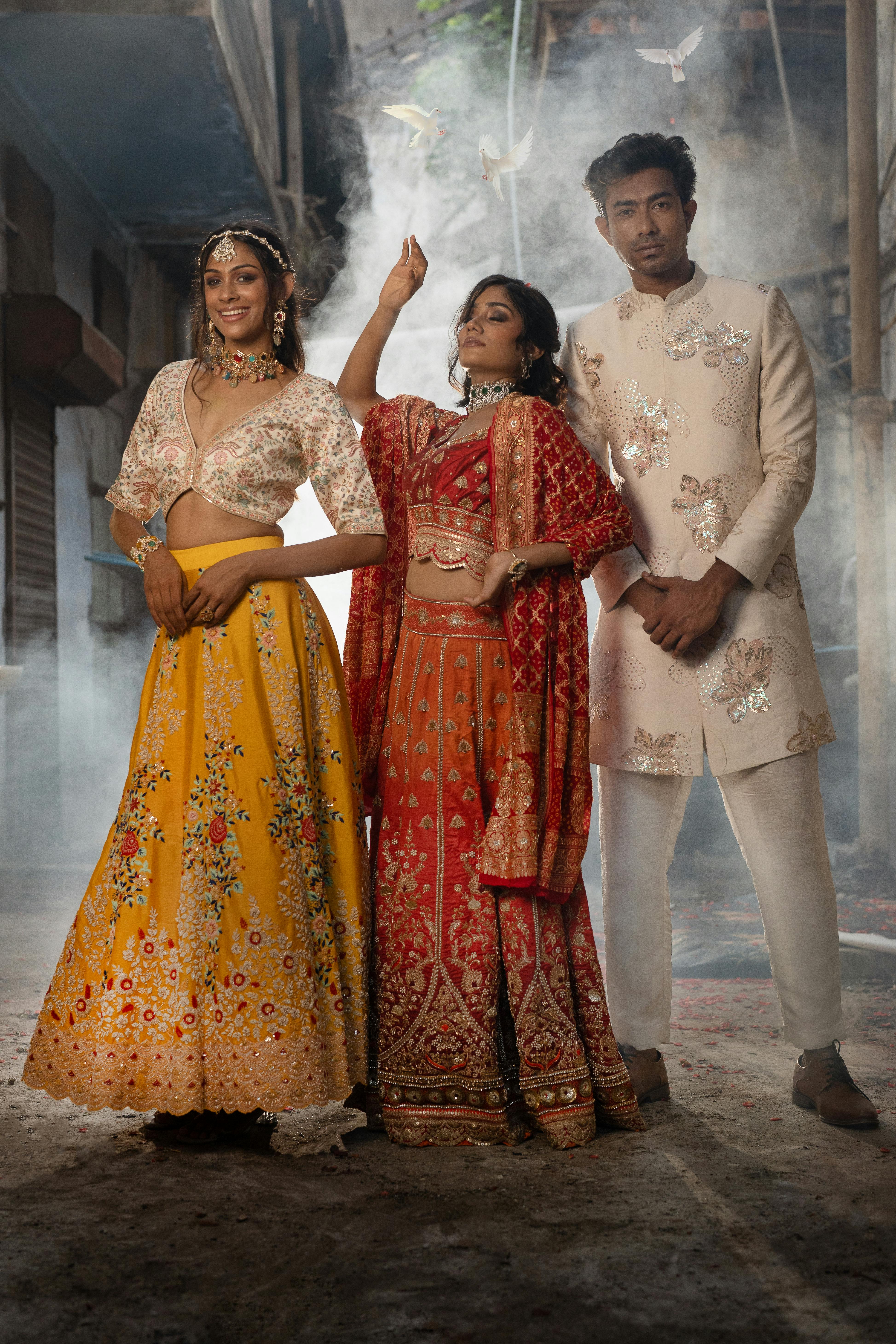 Man and Women in Traditional Clothing · Free Stock Photo