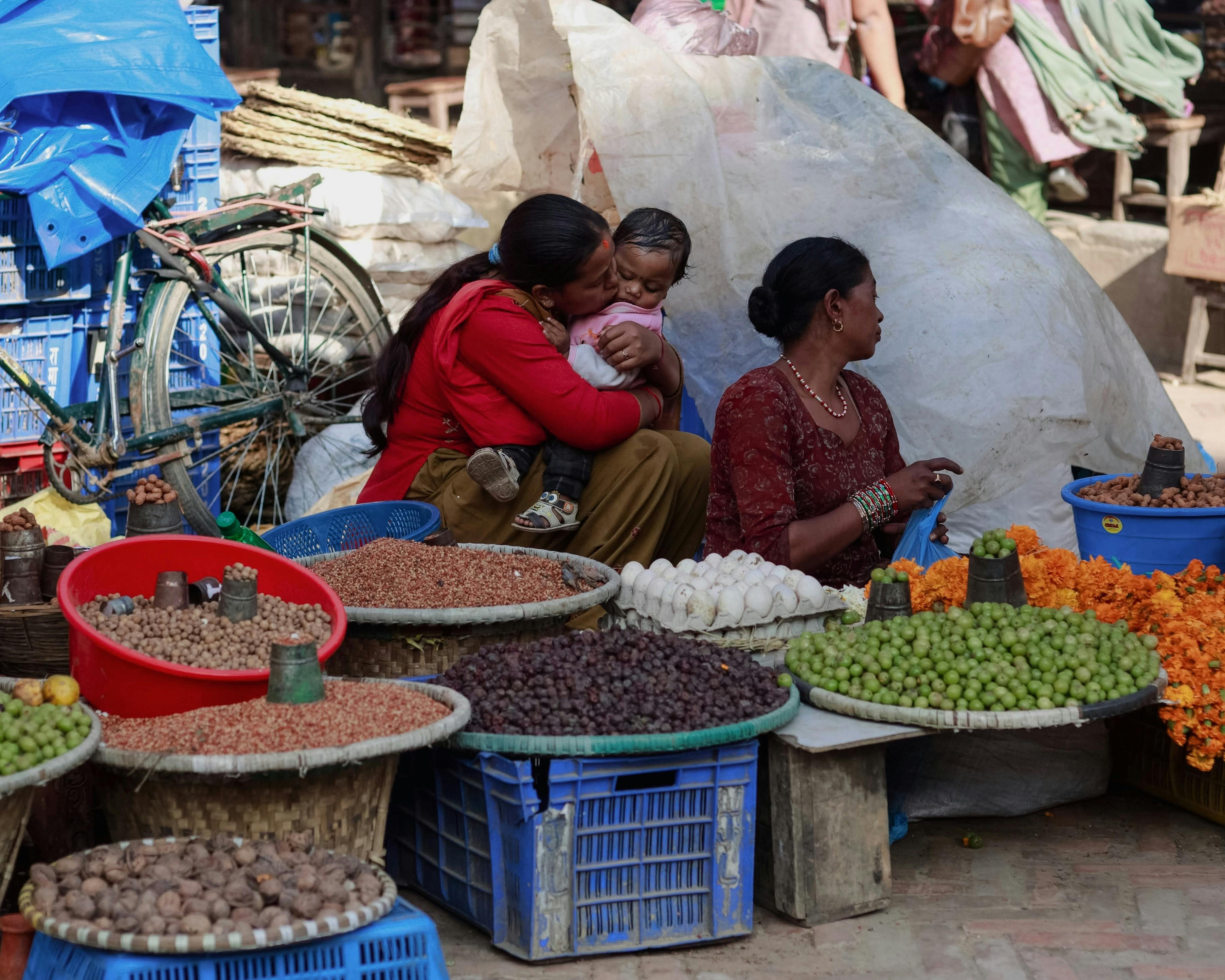 Family of Merchants Selling Fresh Produce · Free Stock Photo