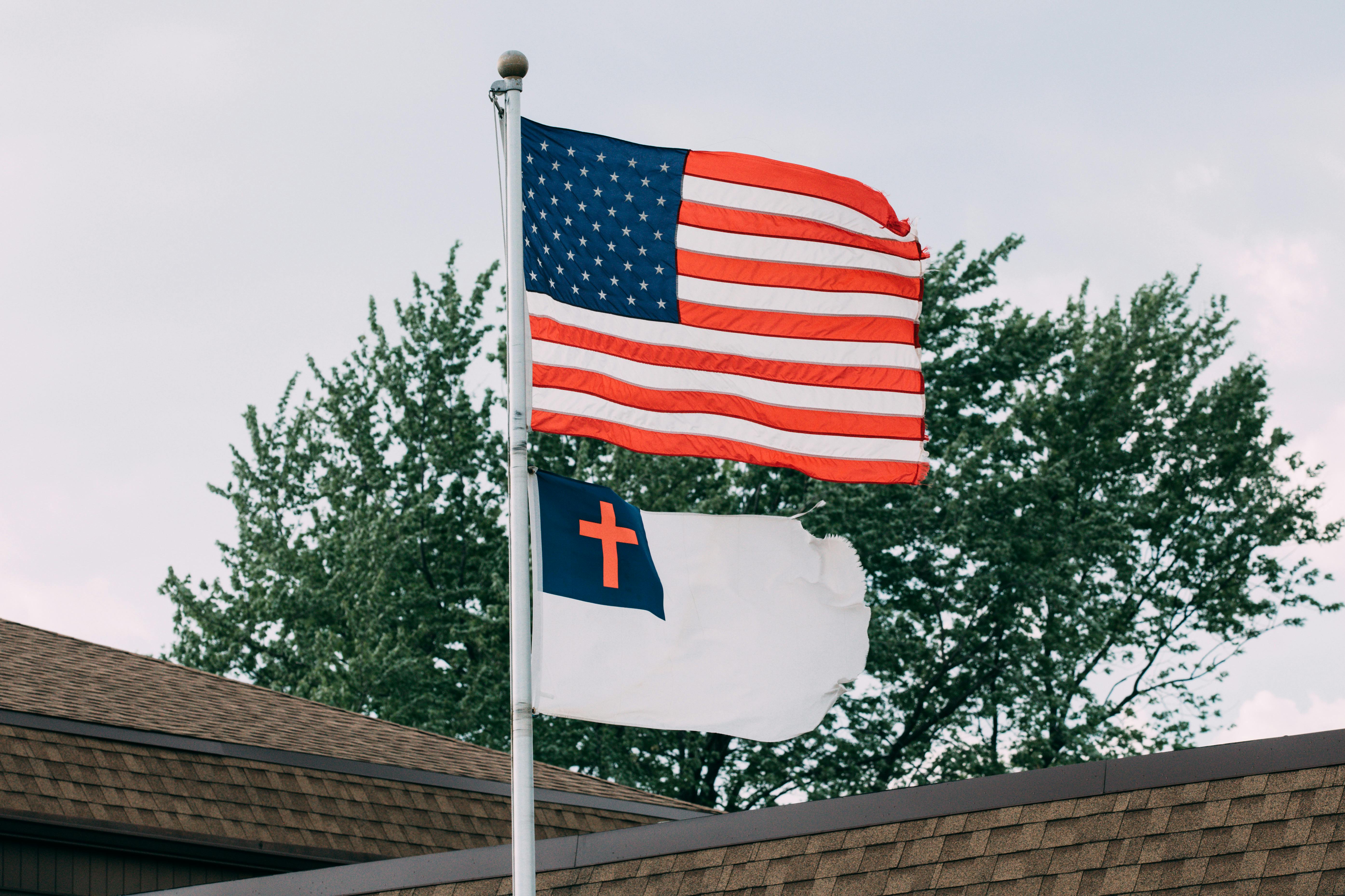 An American and a Christian Flags · Free Stock Photo