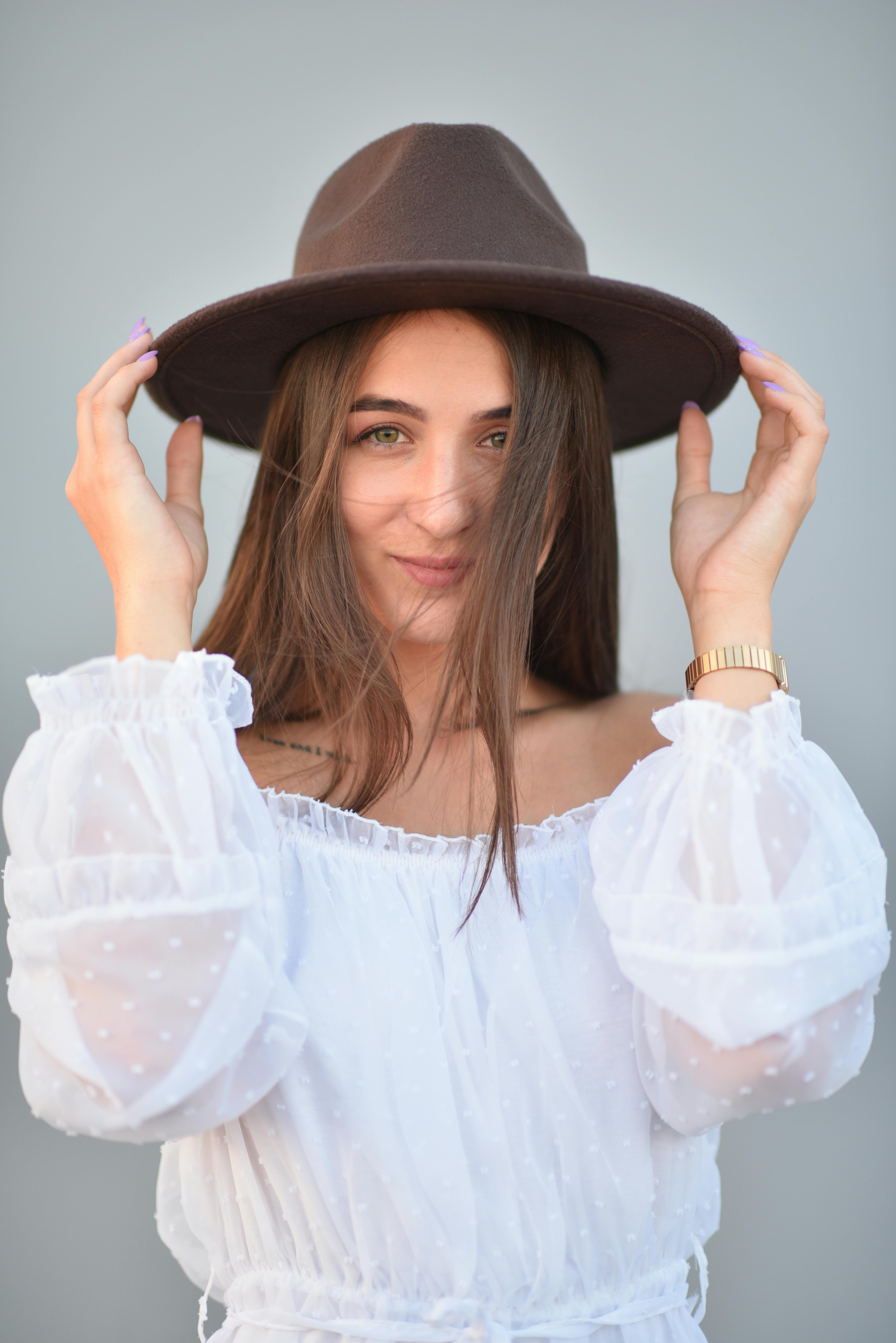 Woman Posing by Wall · Free Stock Photo