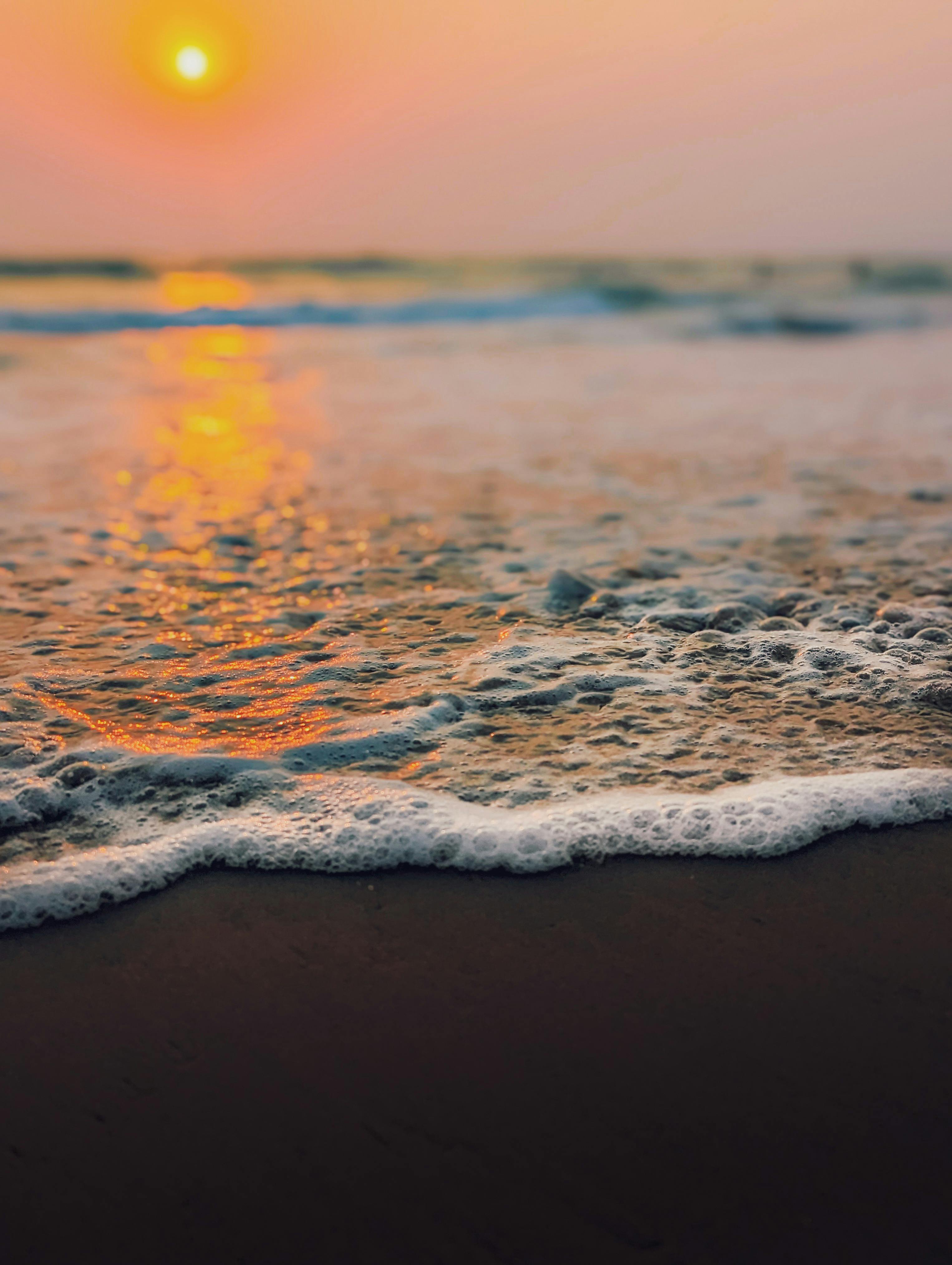 Sea Waves on the Beach at Sunset · Free Stock Photo