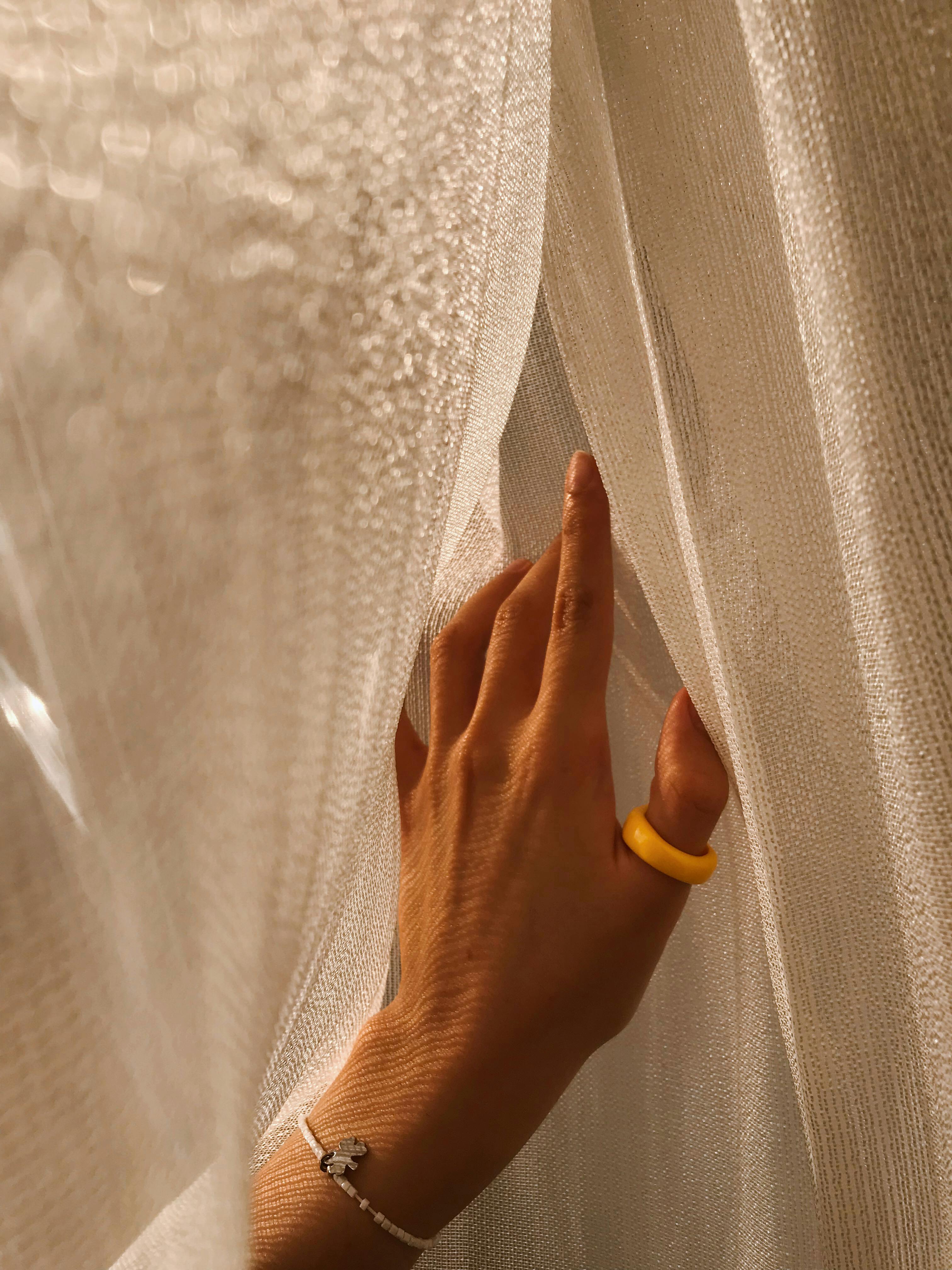 Hand Touching Fabric · Free Stock Photo