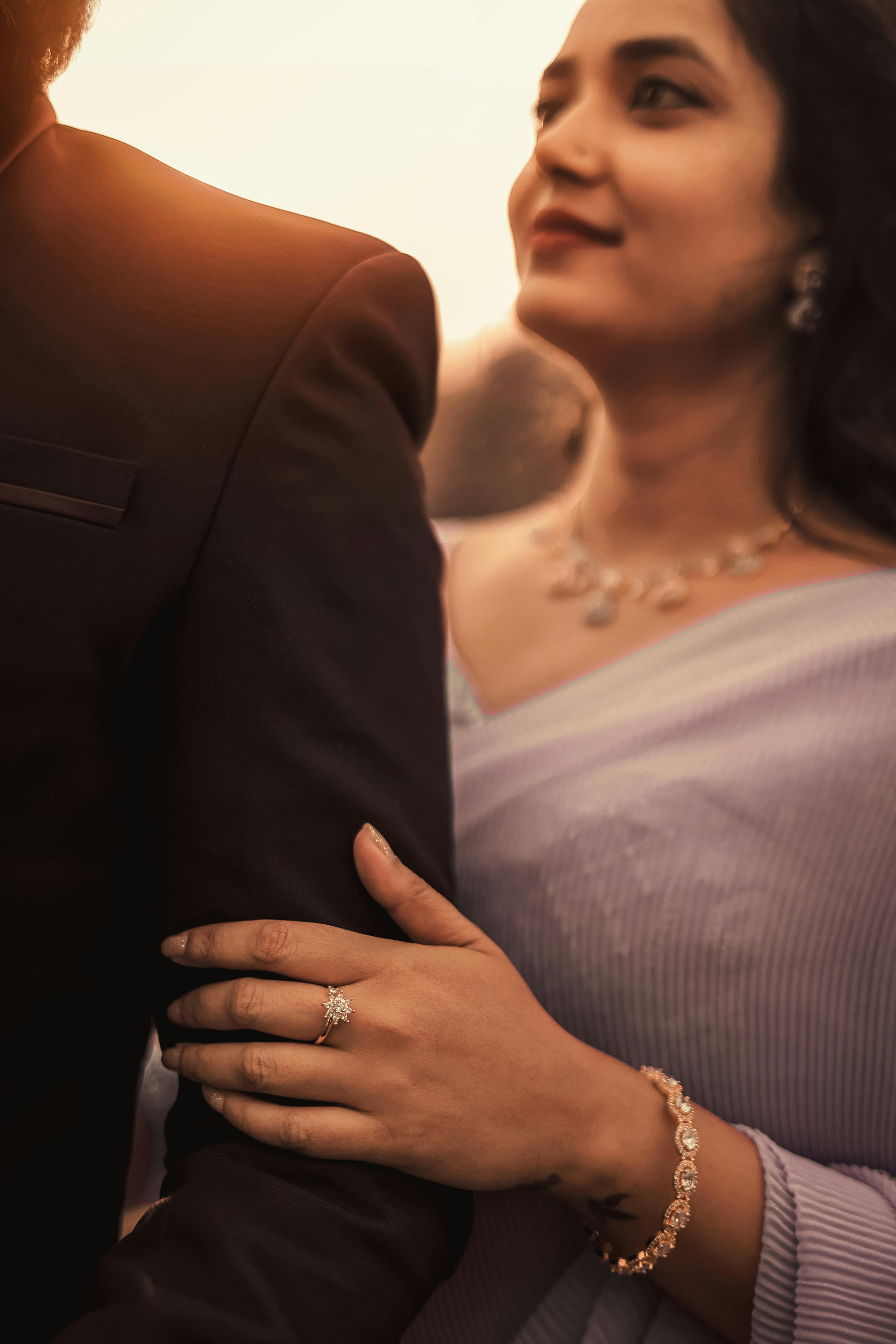 Woman Holding Man's Hand · Free Stock Photo