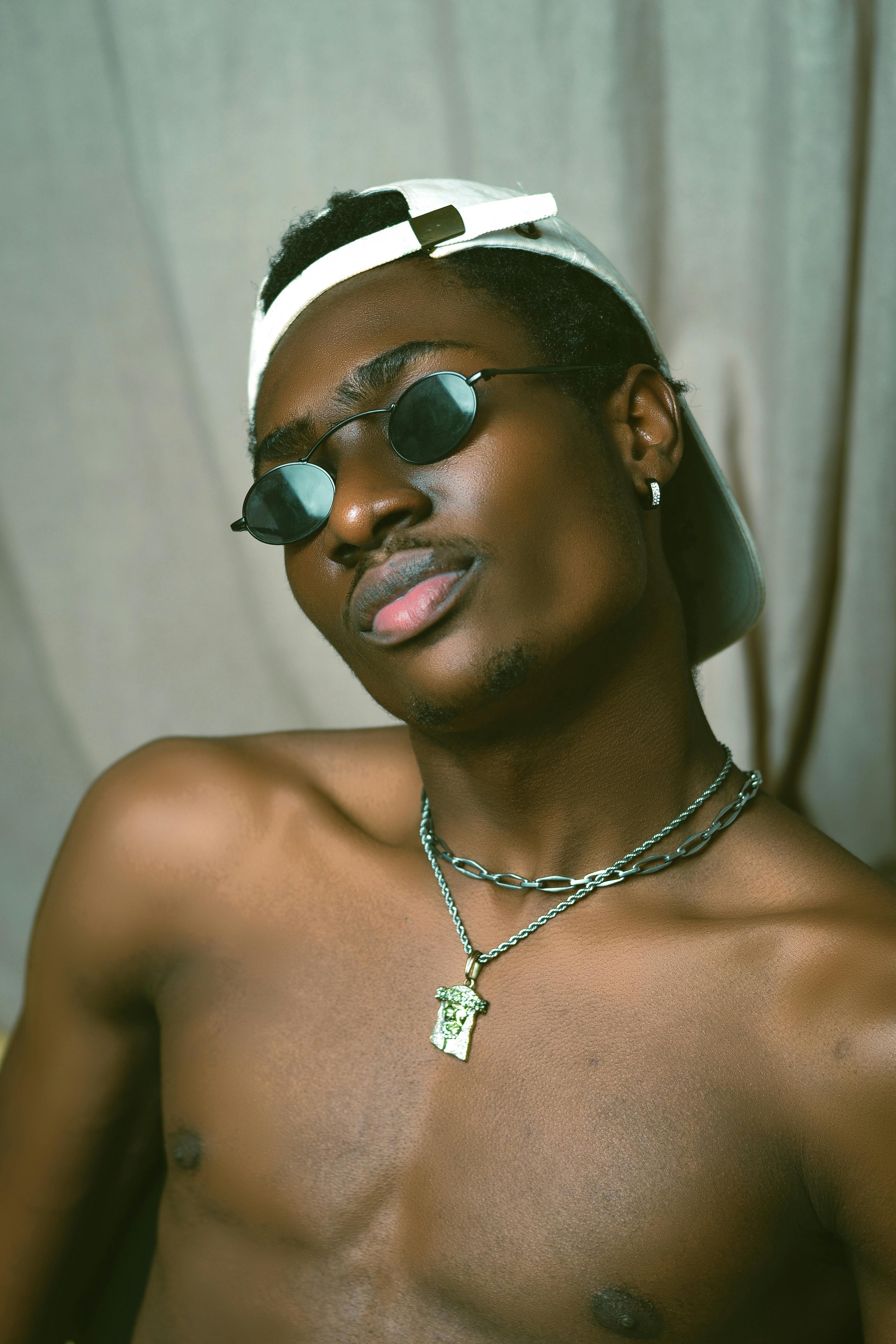 Topless Man in Cap and Sunglasses · Free Stock Photo