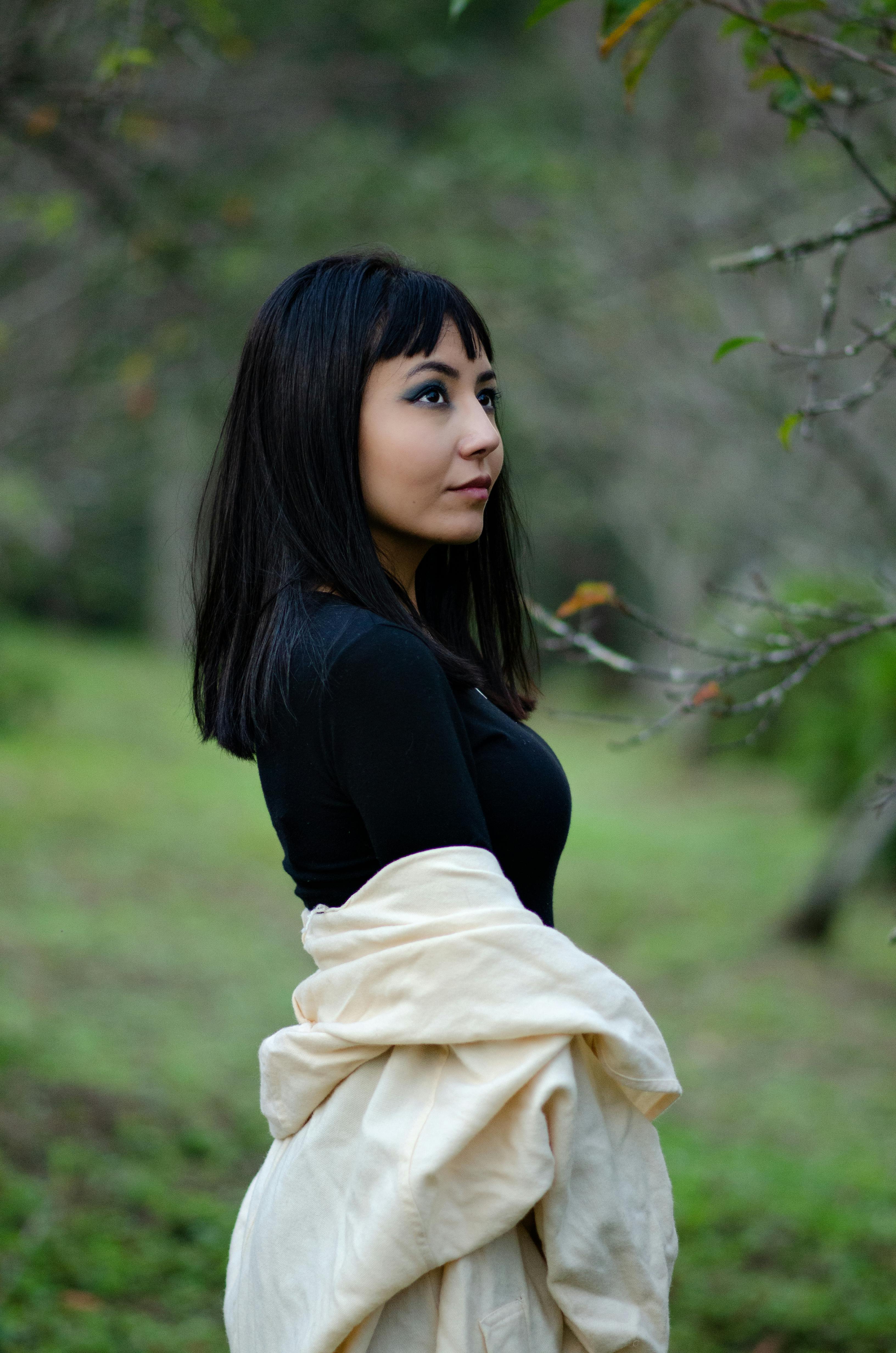 Woman Holding Hands in Hair · Free Stock Photo