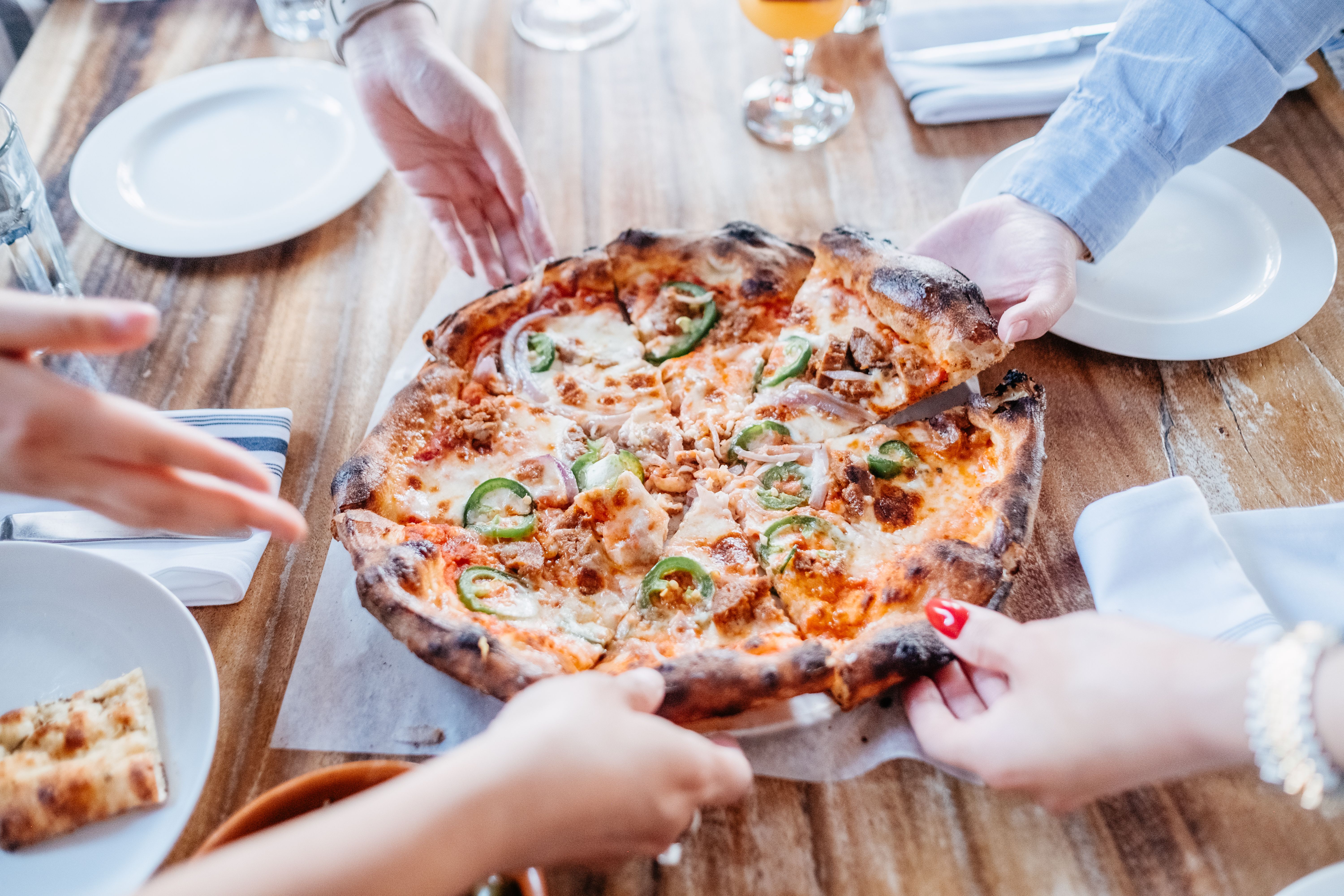 Hands on Pizza · Free Stock Photo