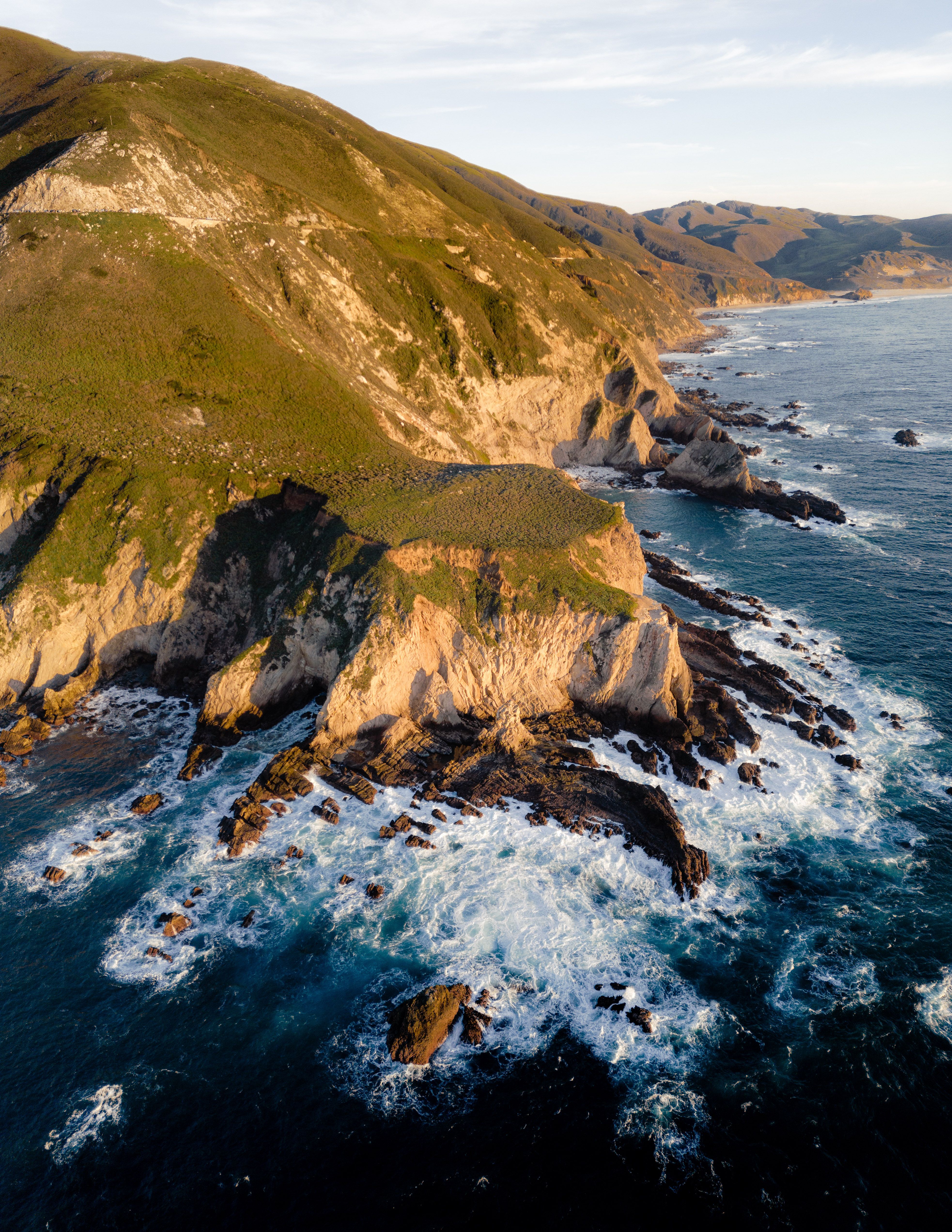 Scenic View of Mountains and Sea · Free Stock Photo