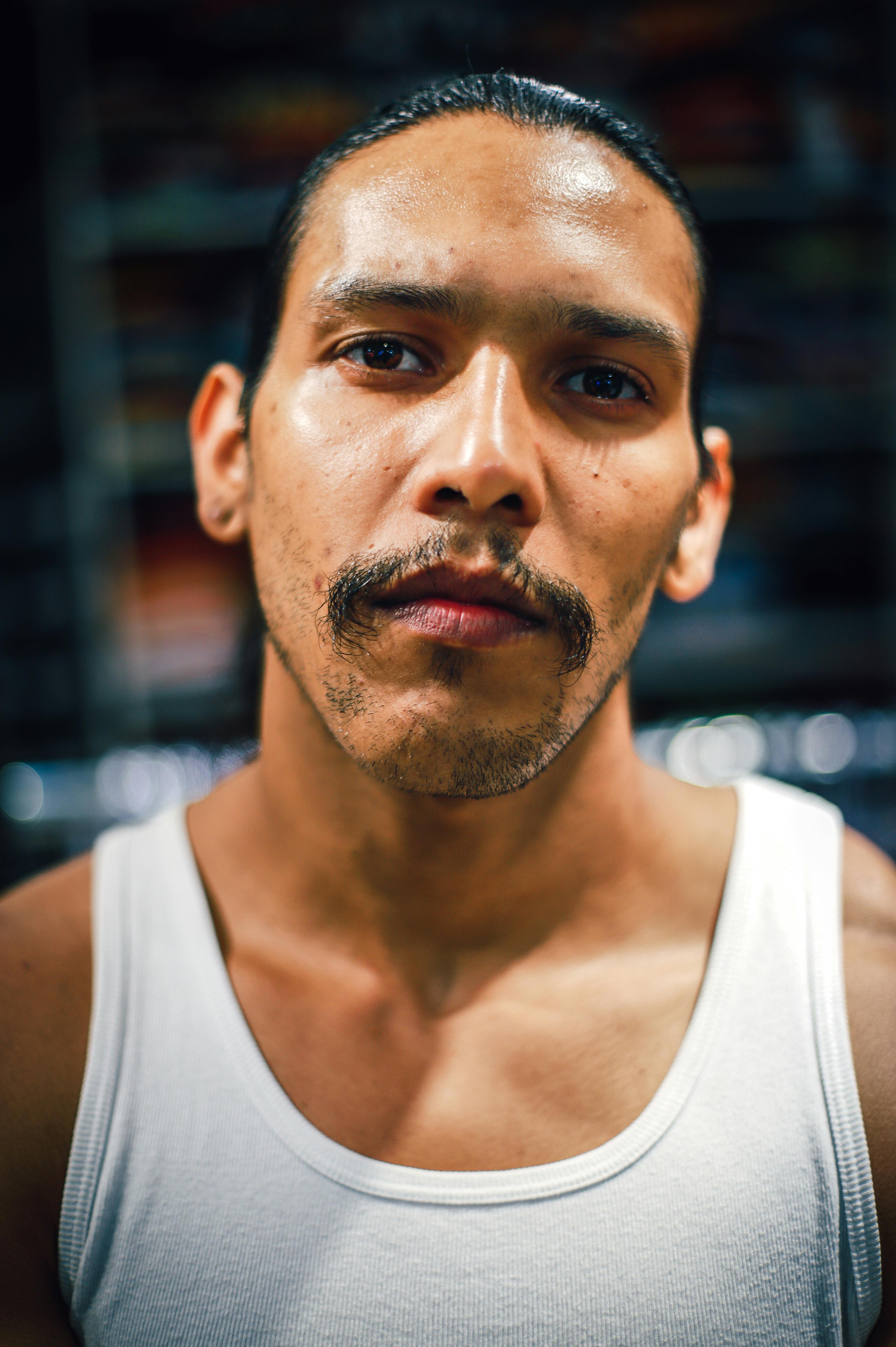 Selective Focus Portrait Photo of Man with Green Eyes Posing · Free ...