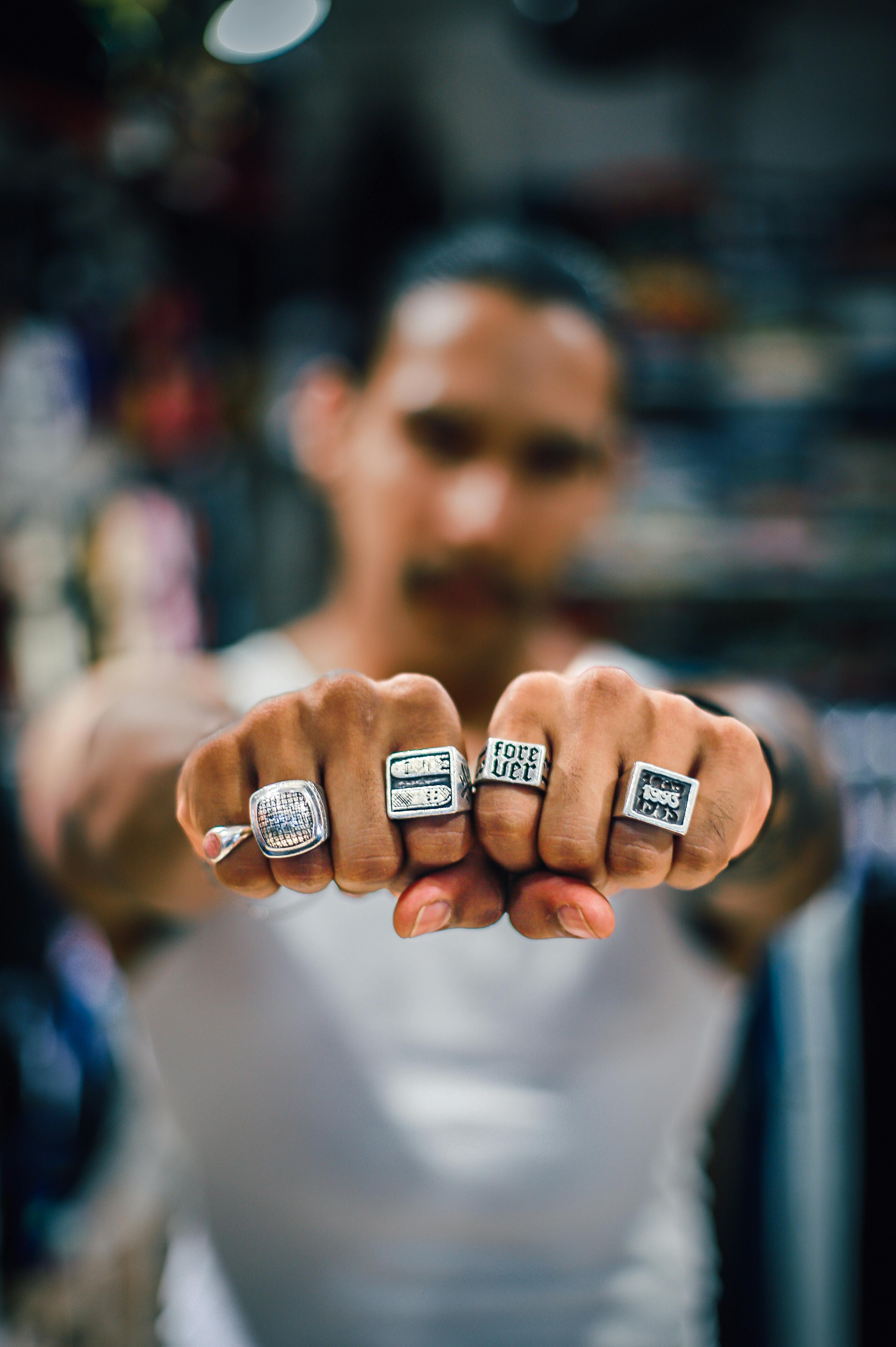 Clenched fist with rings · Free Stock Photo