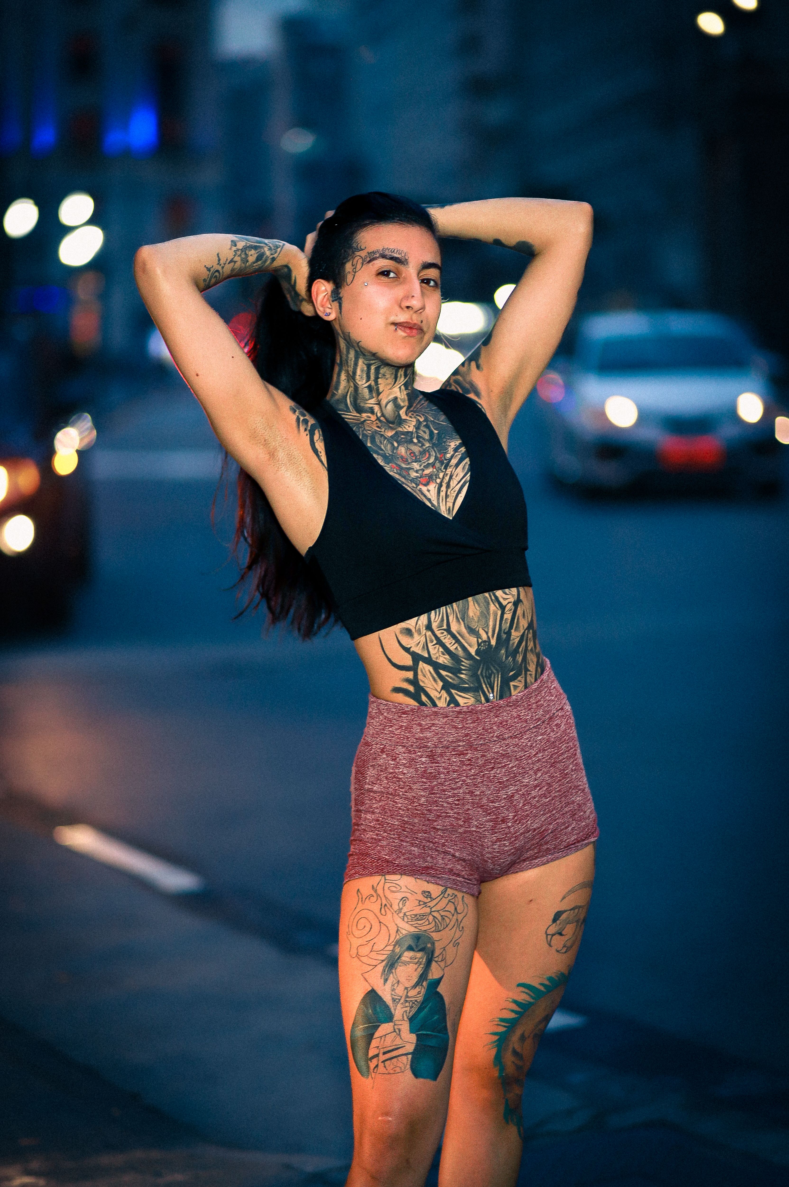 Woman with Tattoos on Street · Free Stock Photo