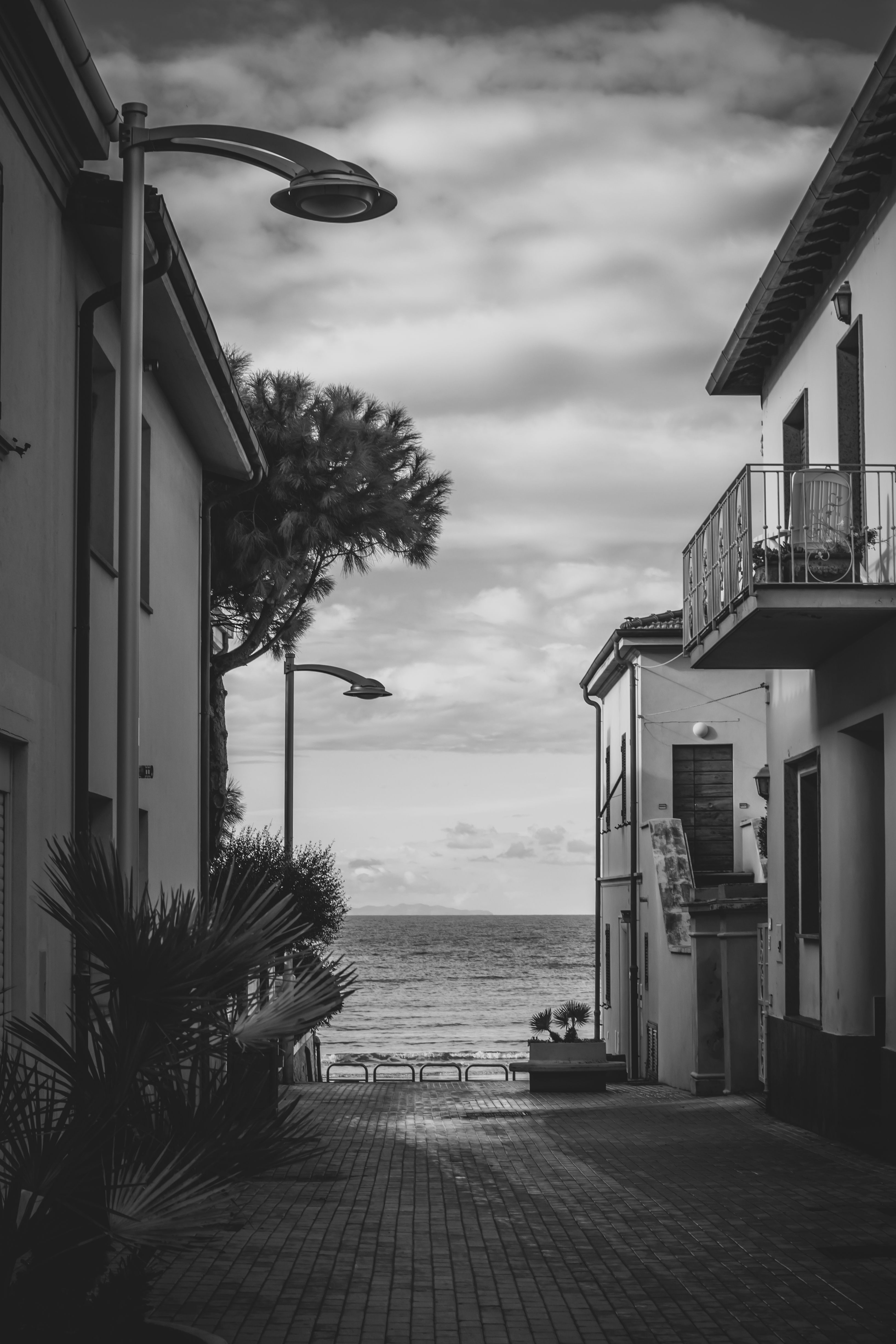 Street in a City and Sea in the Distance · Free Stock Photo