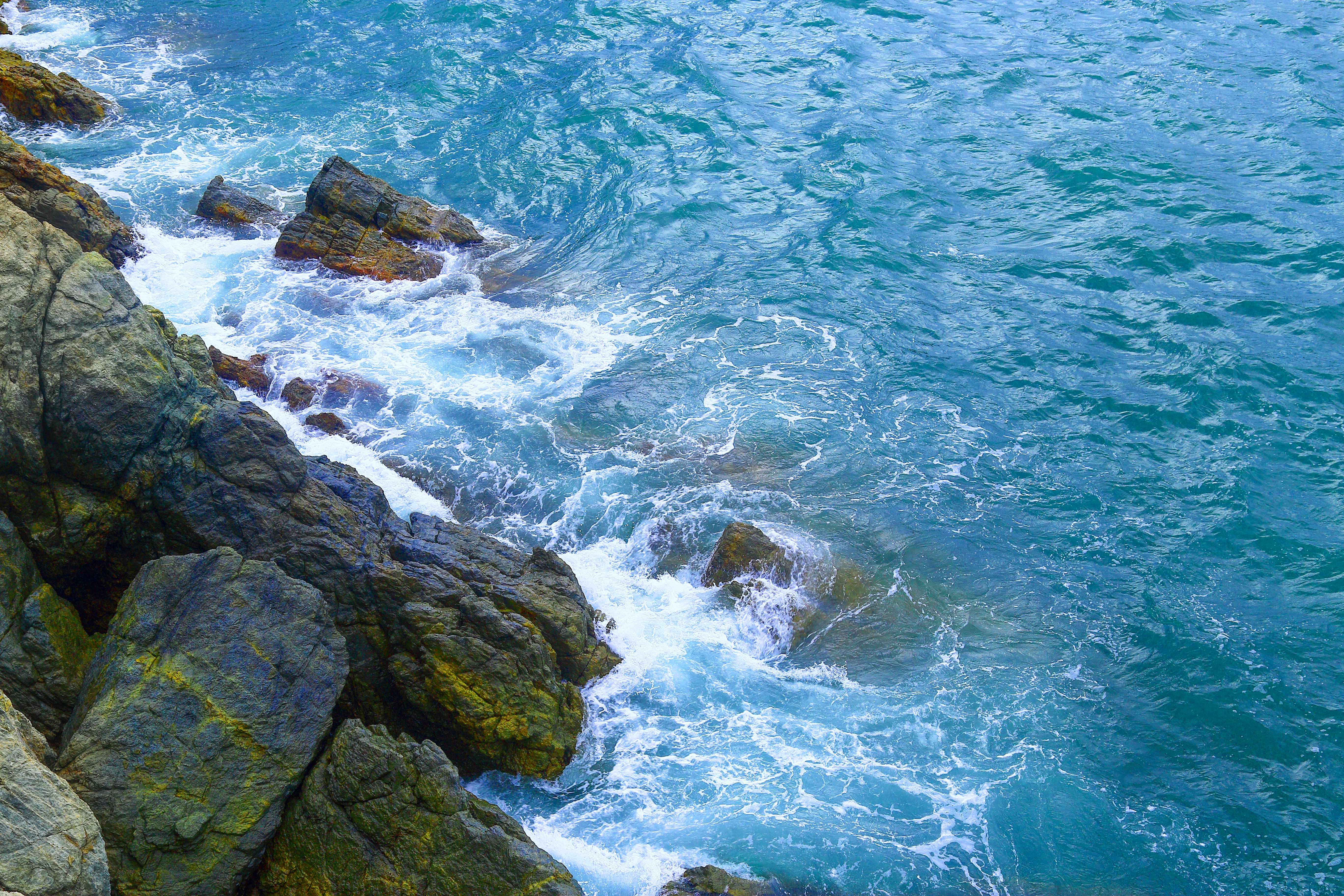 Water on Rocks on Sea Shore · Free Stock Photo