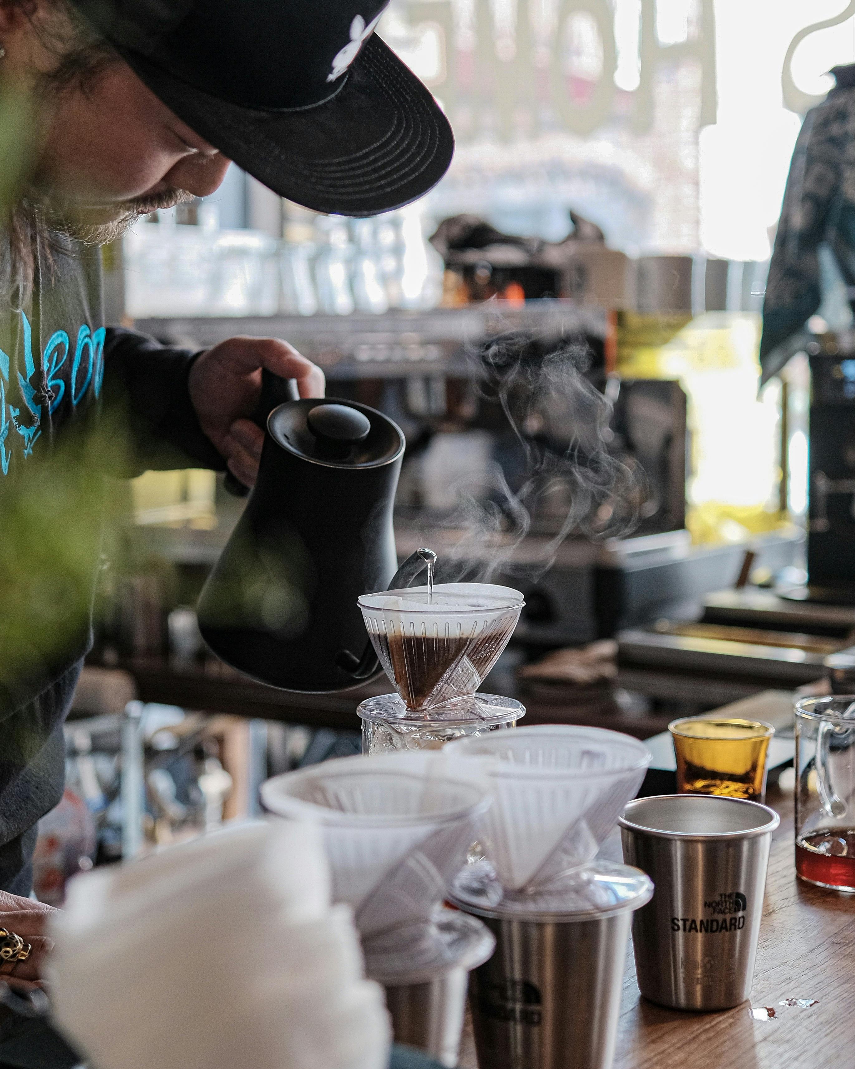 A Man Making Coffee at Restaurant · Free Stock Photo