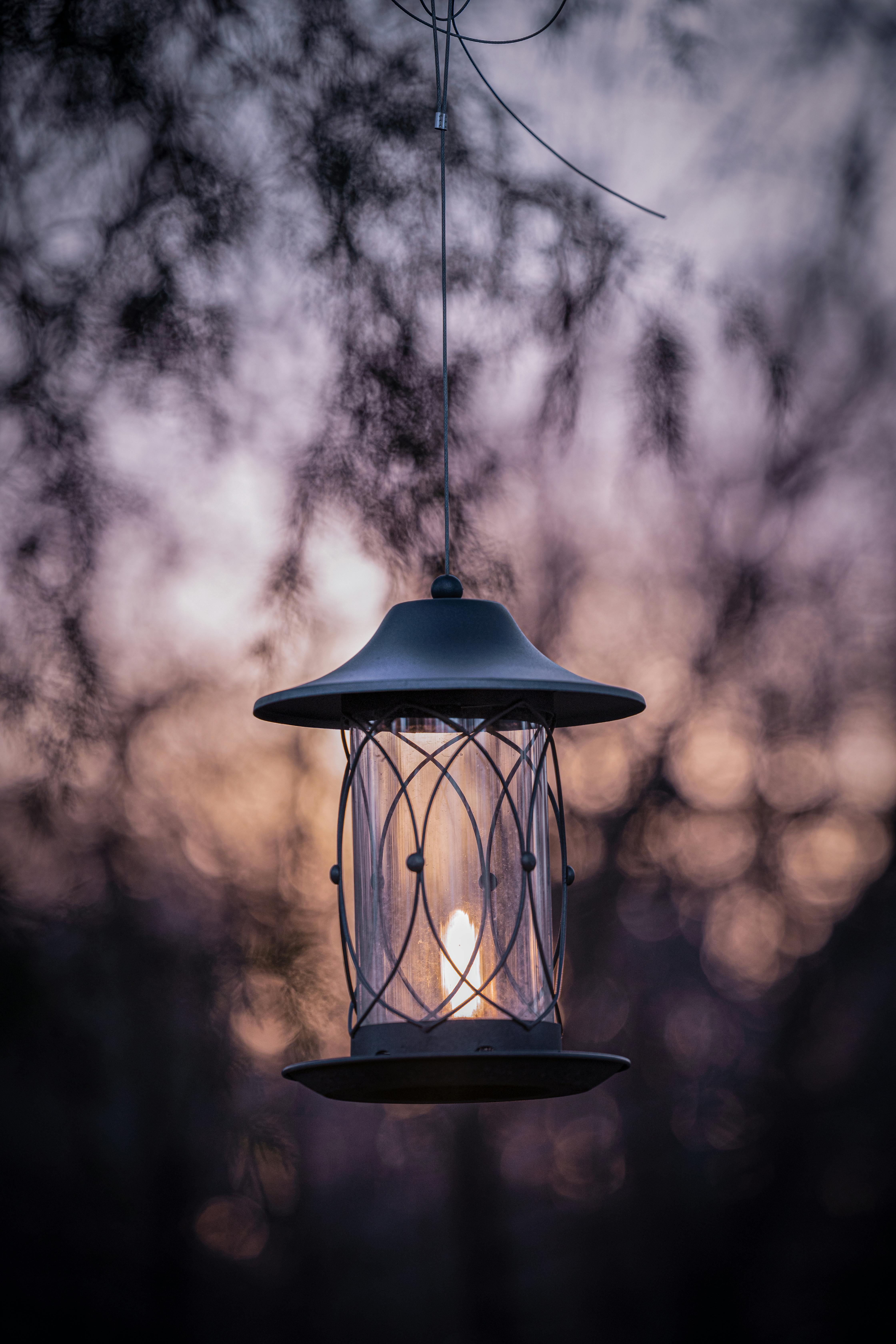Close-Up Shot of a Lamp Hanging on a Wall · Free Stock Photo
