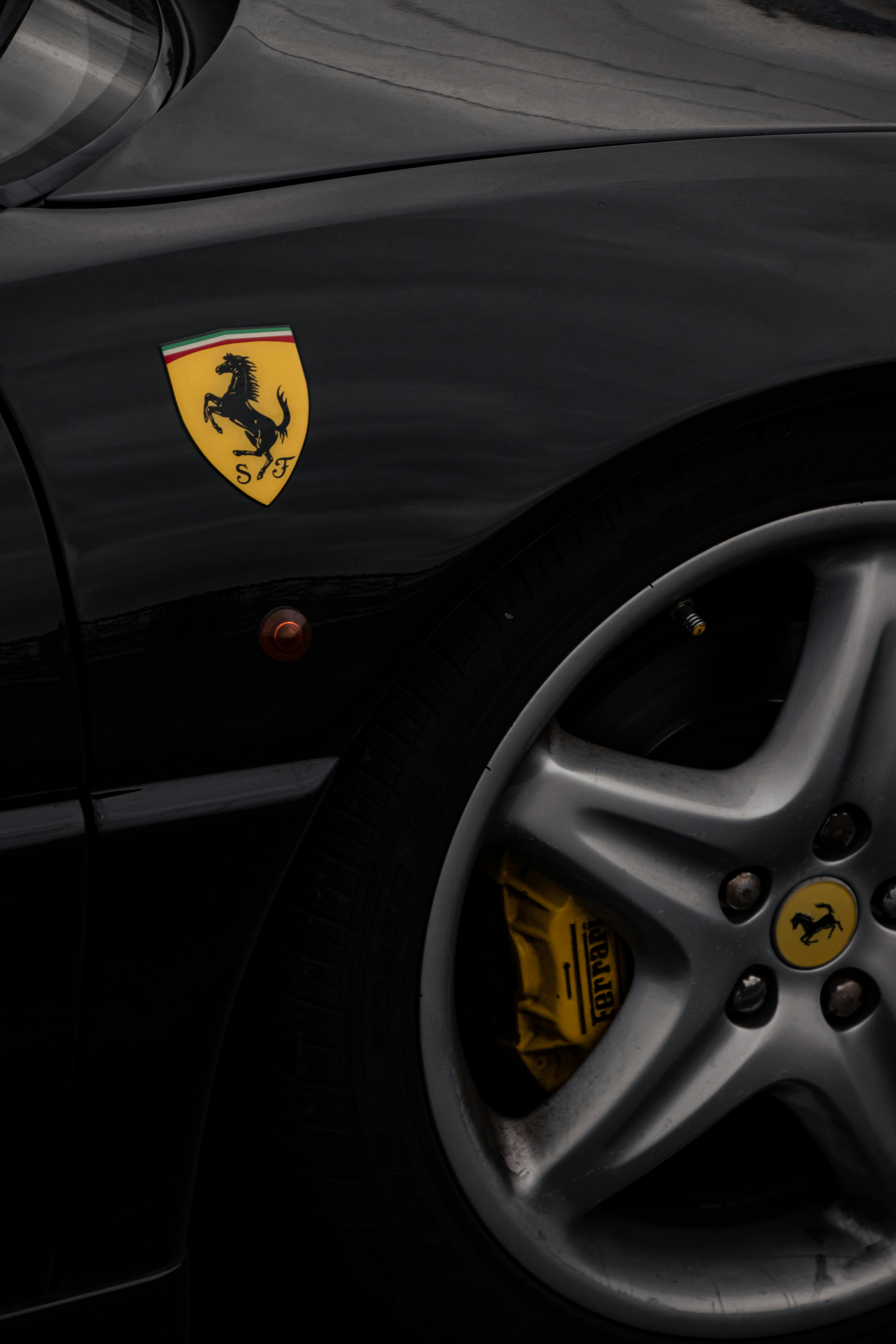 Wheel of Ferrari Car · Free Stock Photo