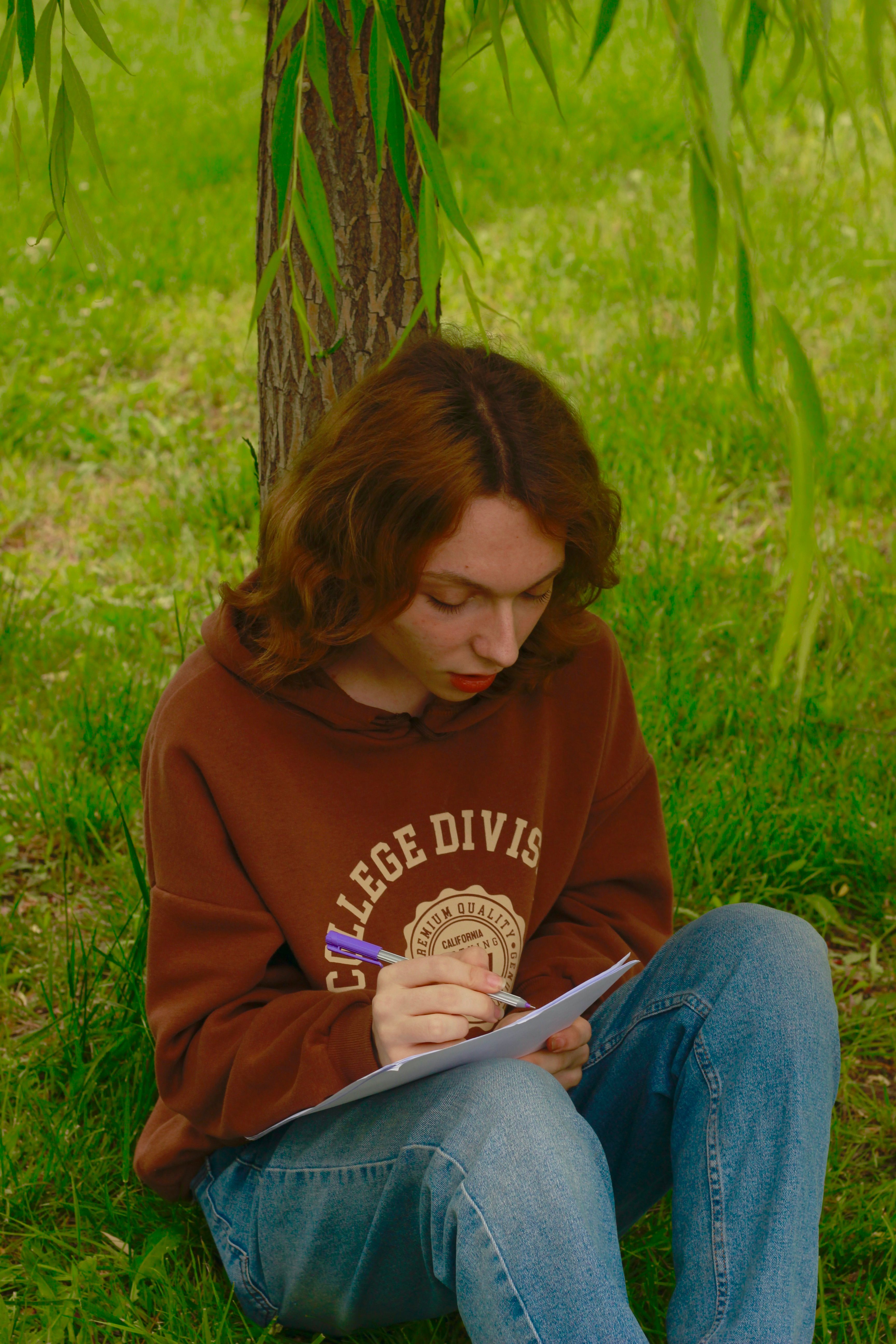 Woman Studying under Tree · Free Stock Photo