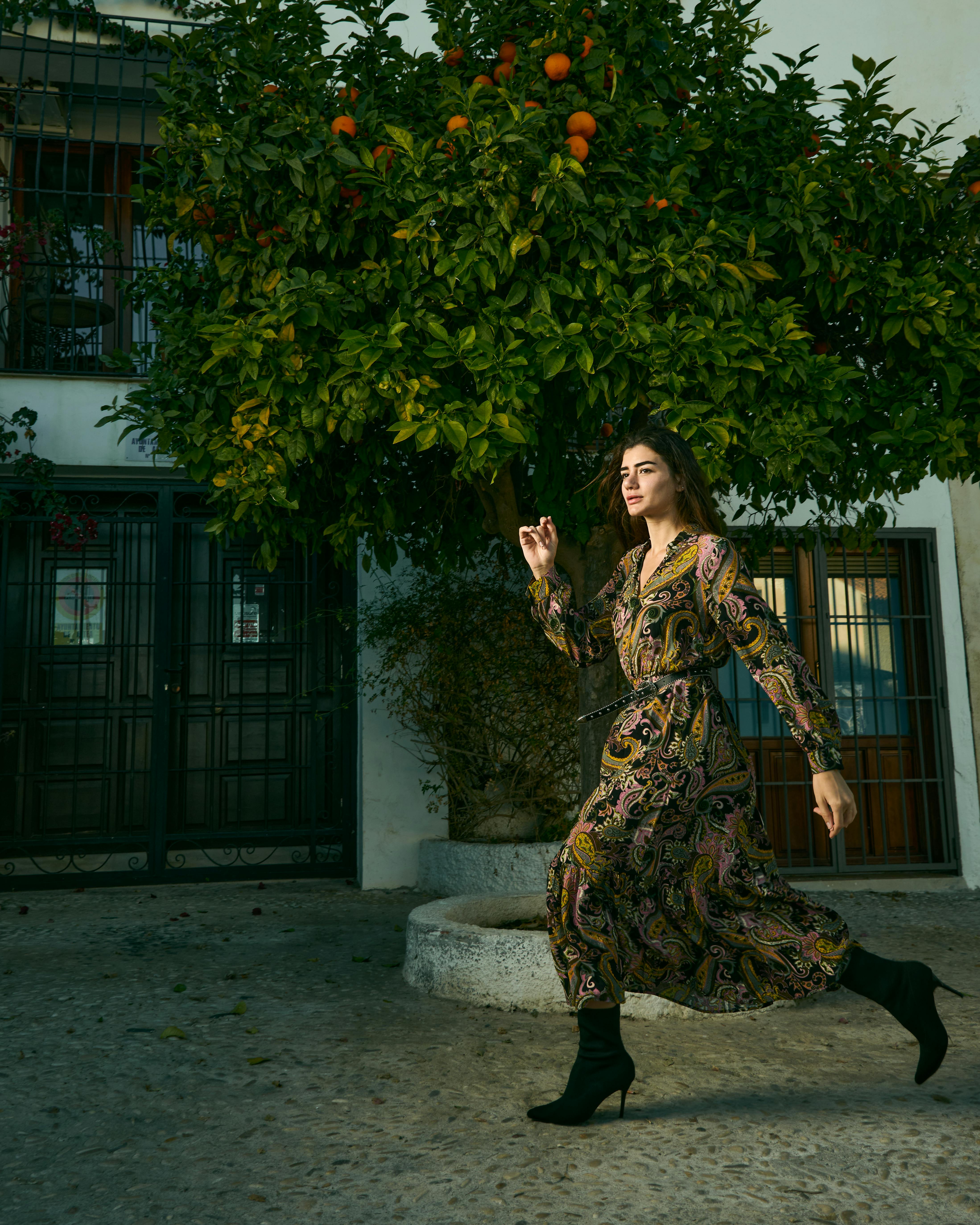 Running Woman in Sundress and High Heels · Free Stock Photo