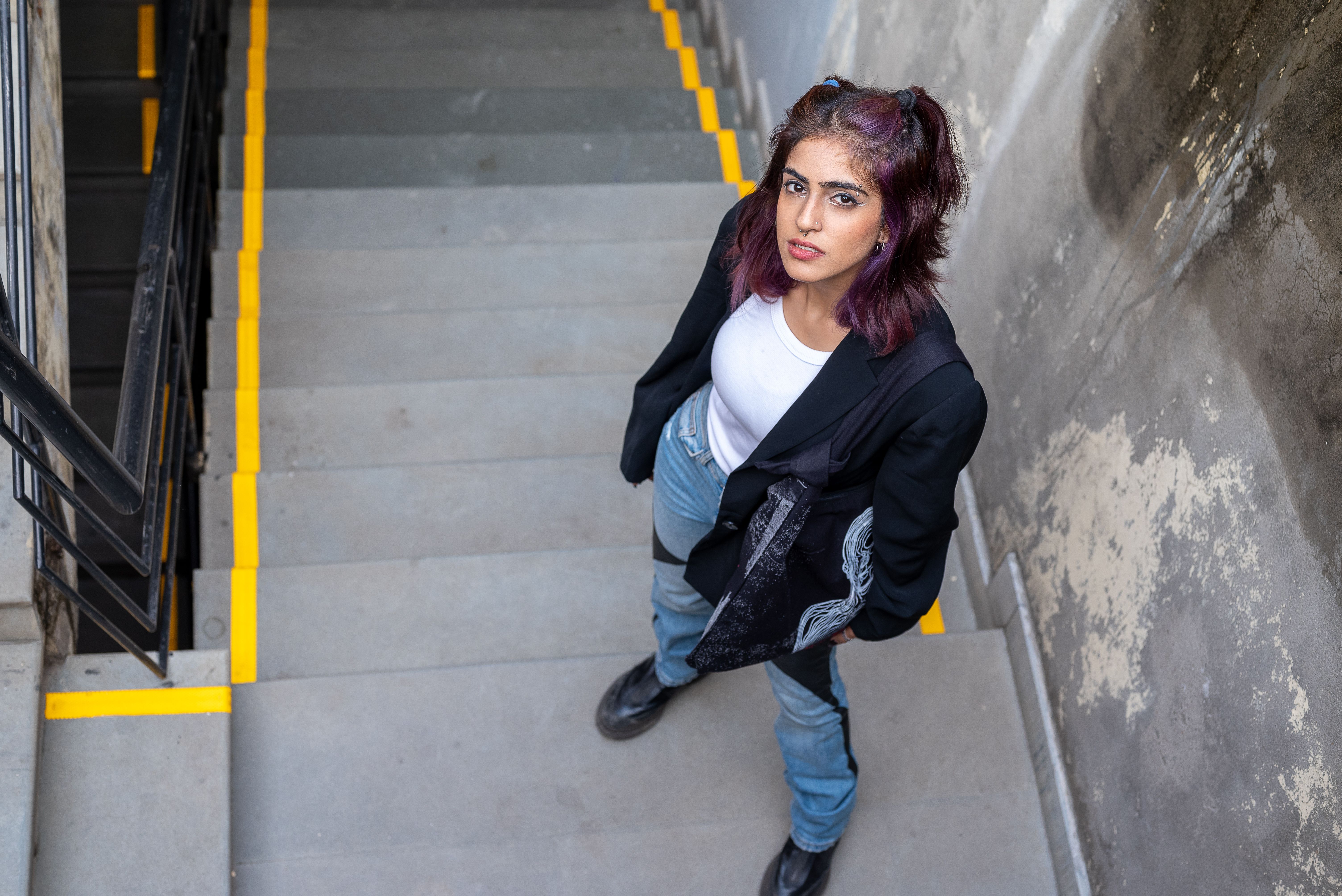 Woman Standing on Stairs · Free Stock Photo