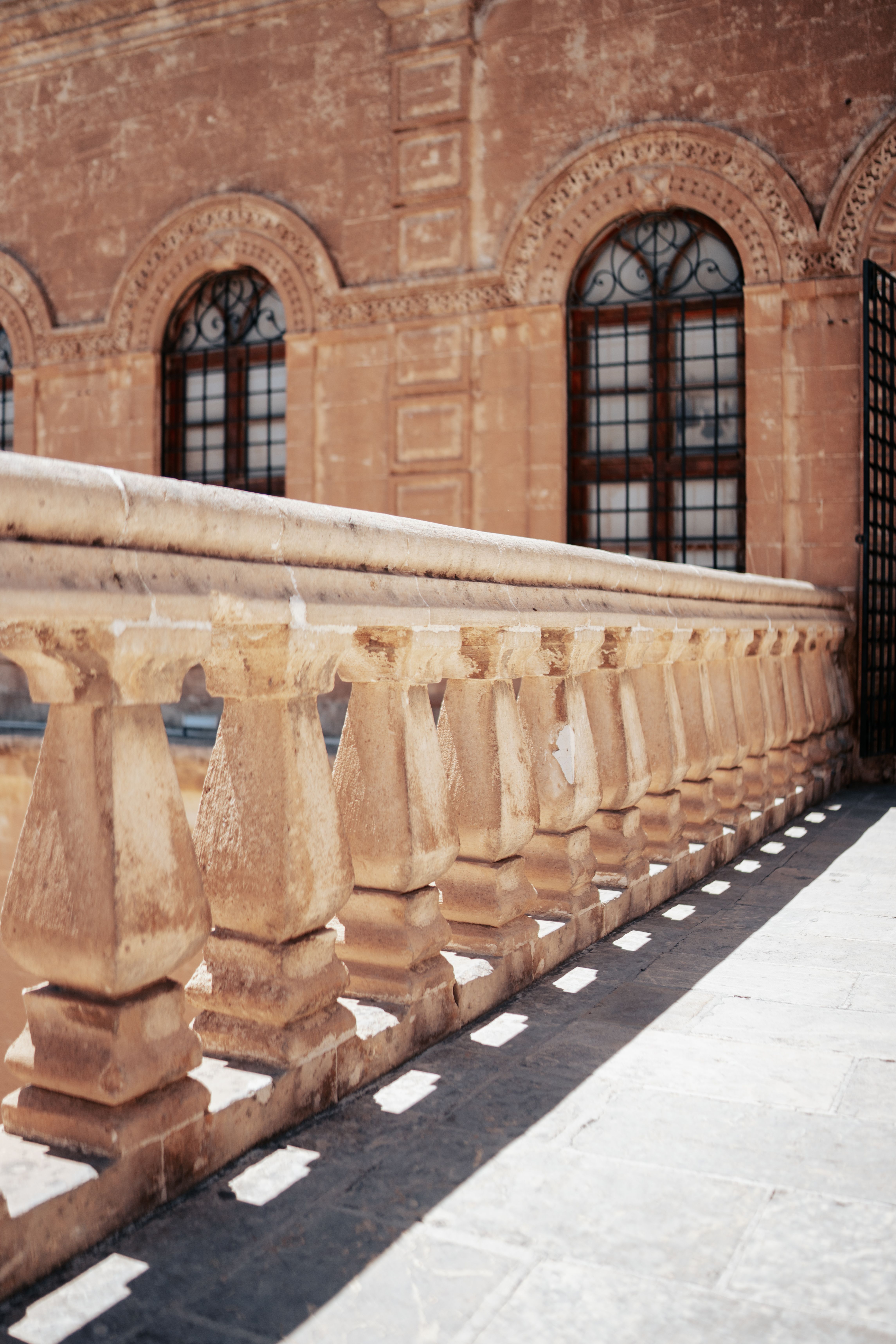 Close-up of a Balustrade and Building Exterior · Free Stock Photo