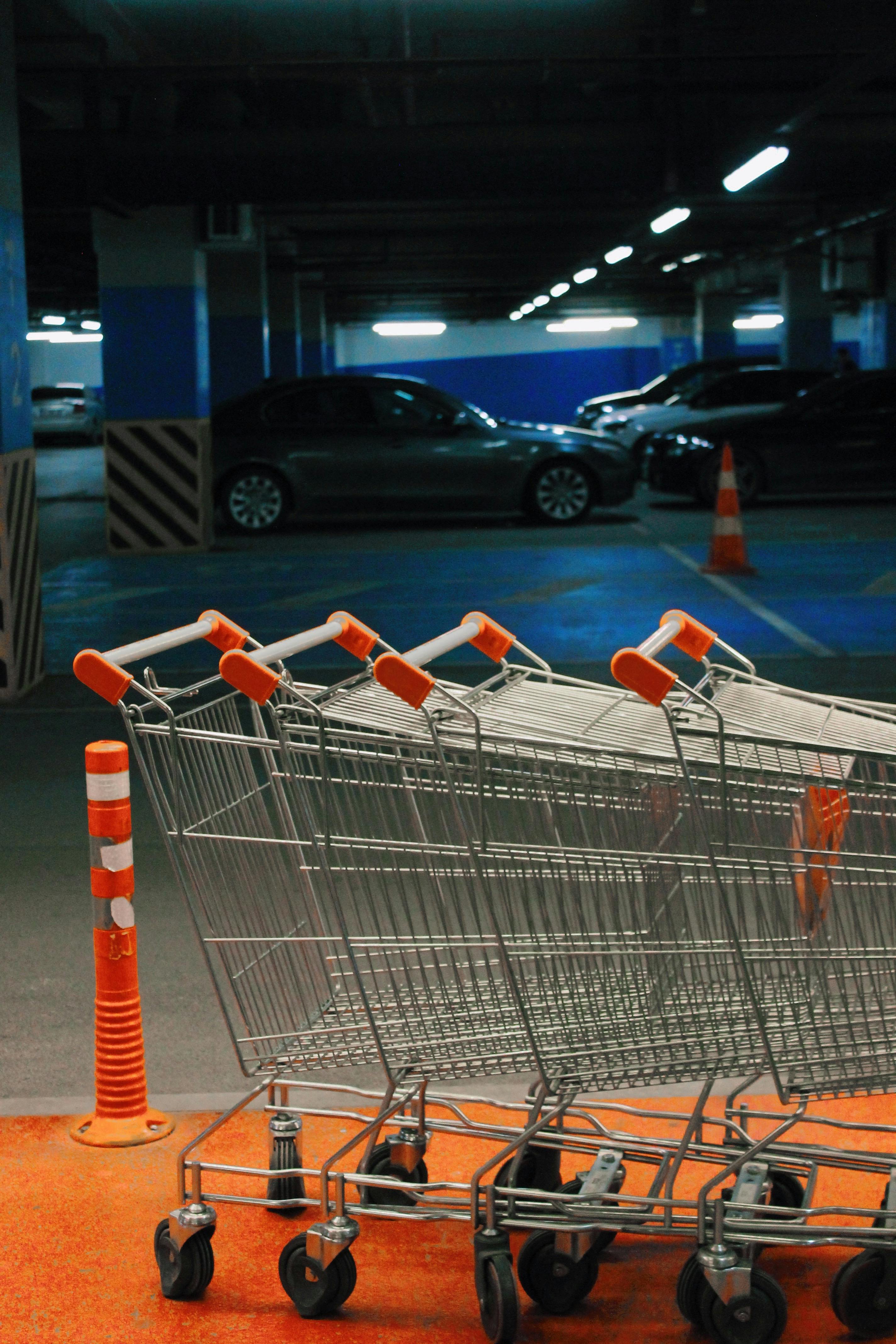 Vehicles Parked Inside Elevated Parking Lot · Free Stock Photo